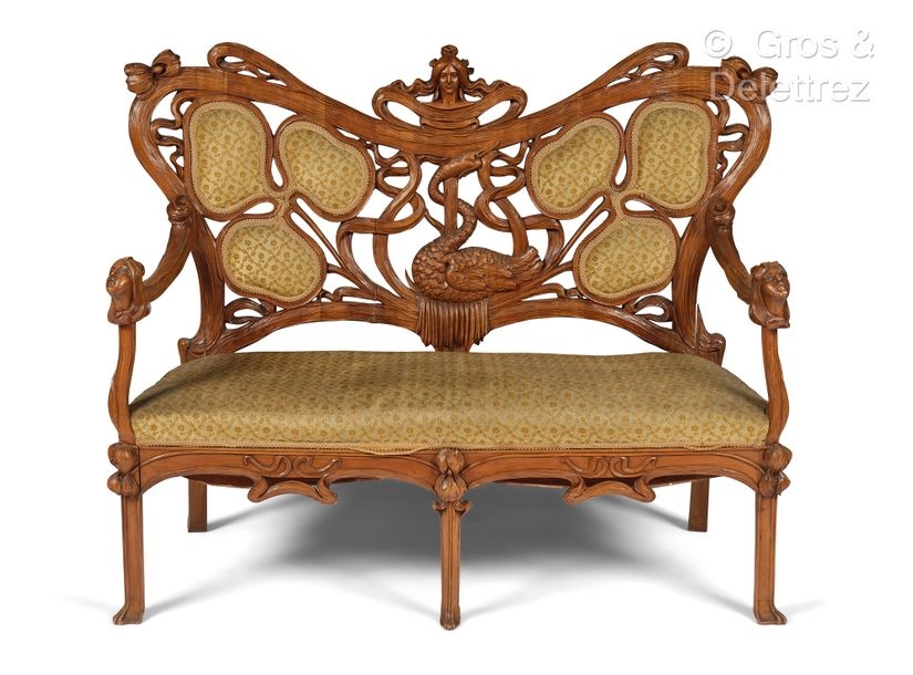 Ernesto Basile | Pair of corner armchairs in carved walnut decorated ...