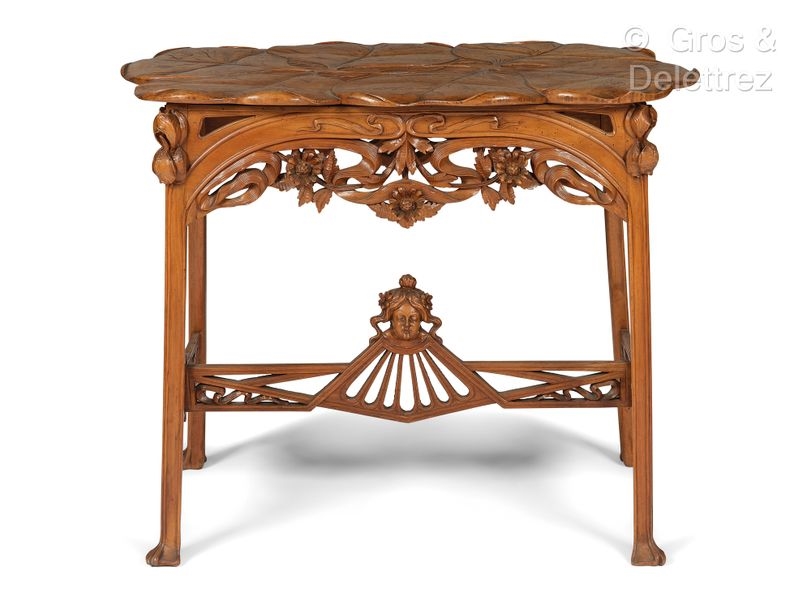 Ernesto Basile | Pair of corner armchairs in carved walnut decorated ...