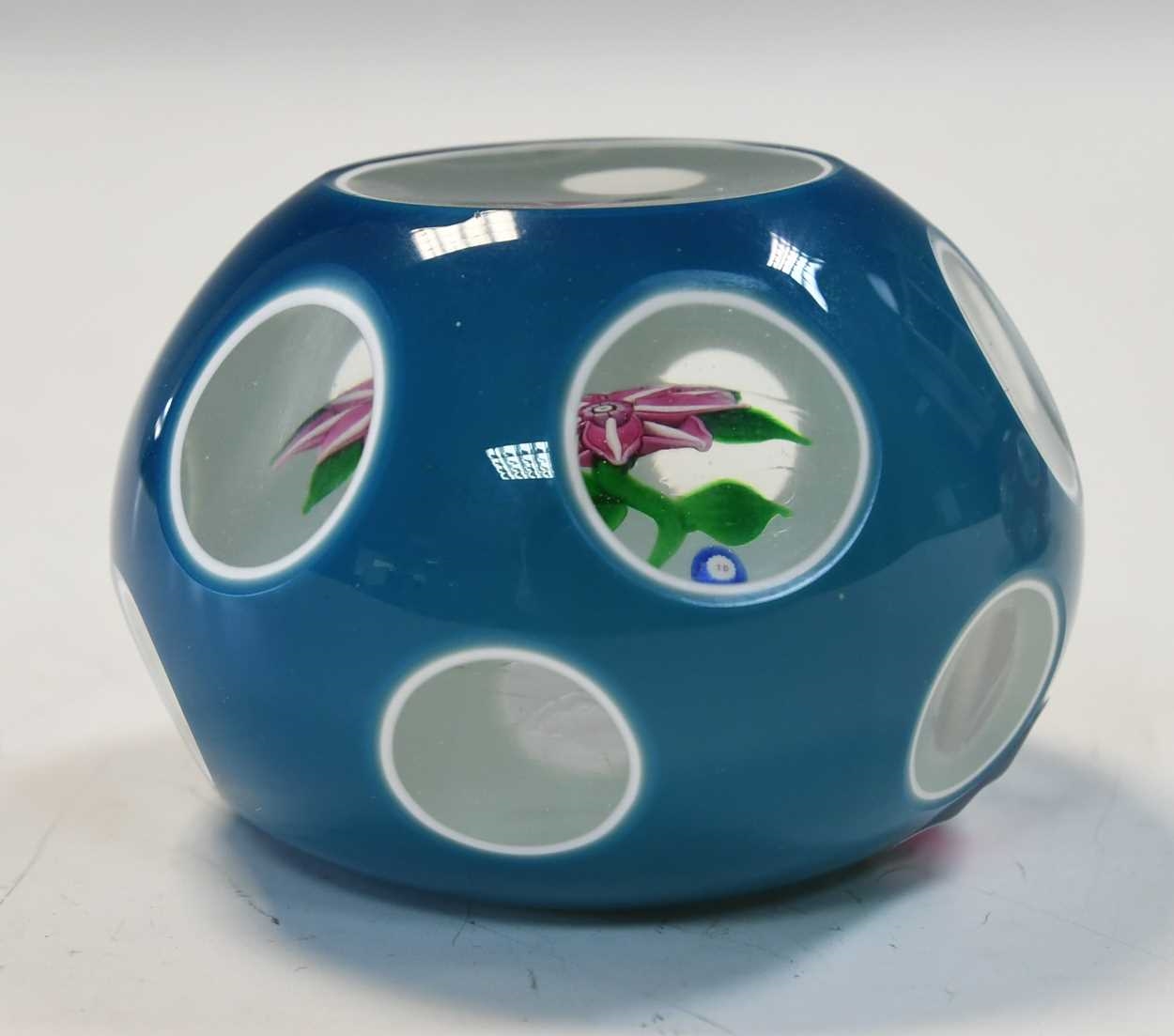 John Deacons | A group of three John Deacons faceted glass paperweights ...