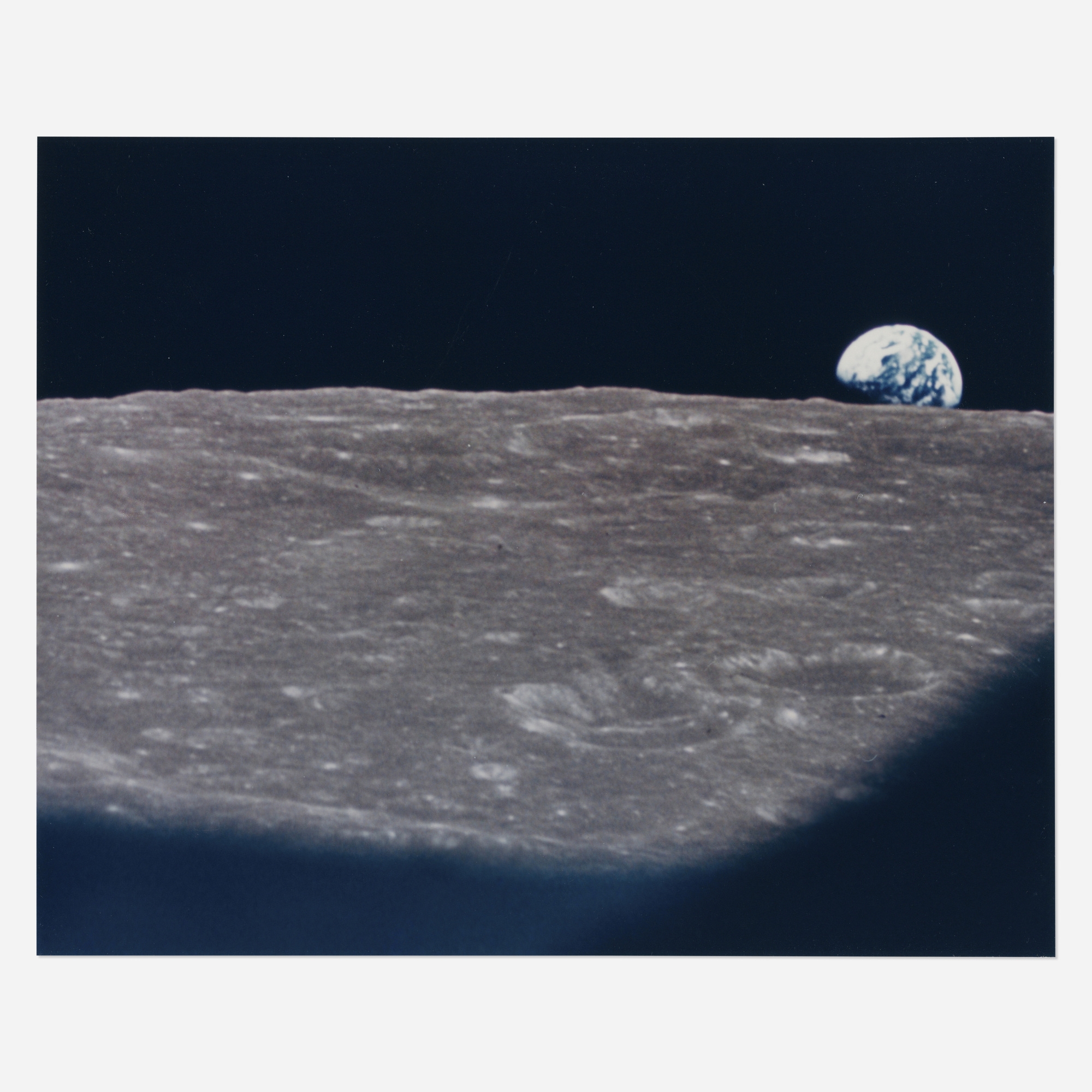 Frank Borman | Earthrise: the majestic Earth emerging above the bleak ...