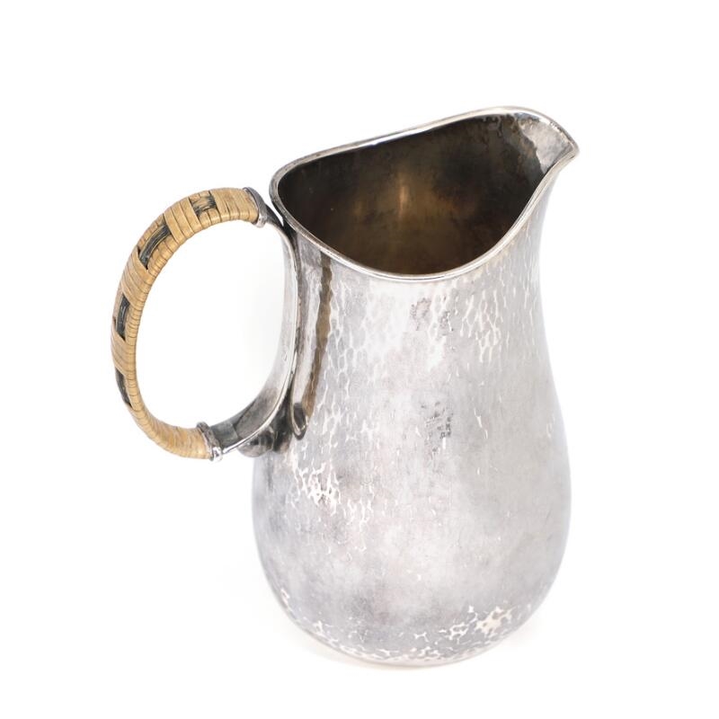 Karl Gustav Hansen | A hammered creamer (1936) | MutualArt