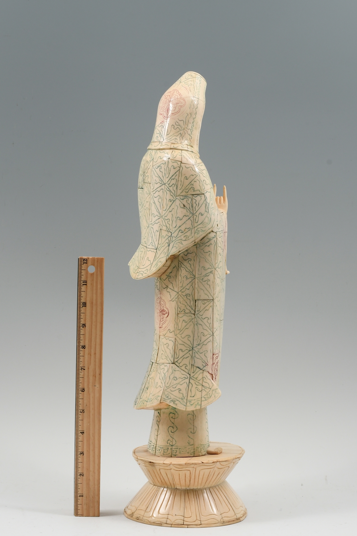 Yin Quan | Bone clad Quan Yin holding a bottle that holds the water of ...