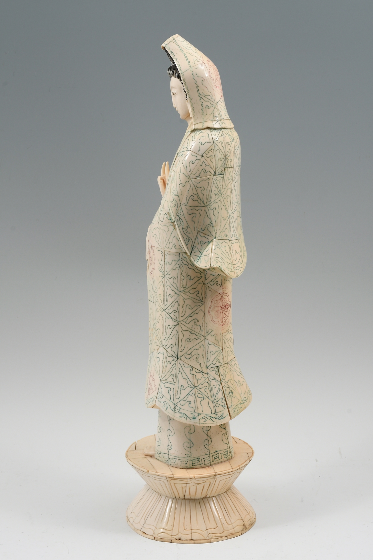 Yin Quan | Bone clad Quan Yin holding a bottle that holds the water of ...