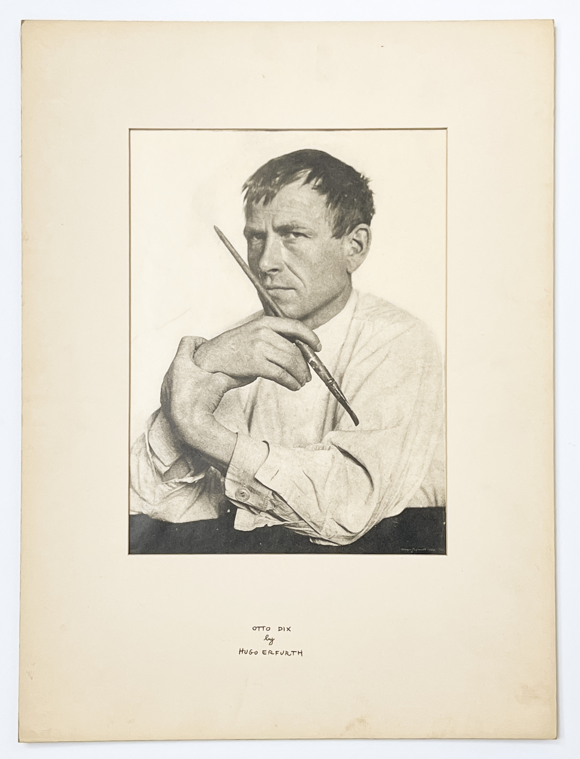 Hugo Erfurth | Portrait of Otto Dix with Paintbrush (1929) | MutualArt