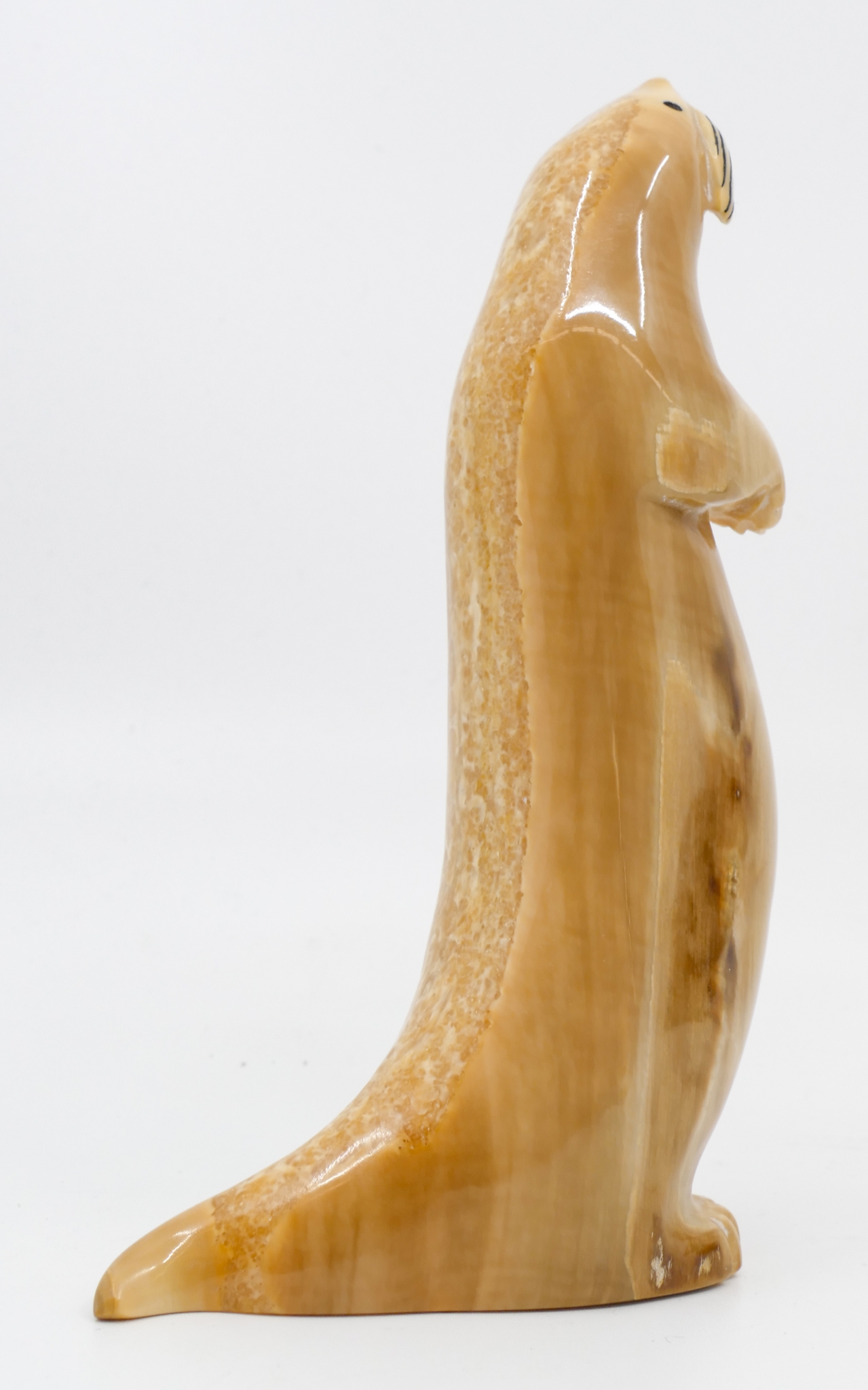 Eddie Lynd | INUIT SCRIMSHAWED SEA OTTER SCULPTURE | MutualArt