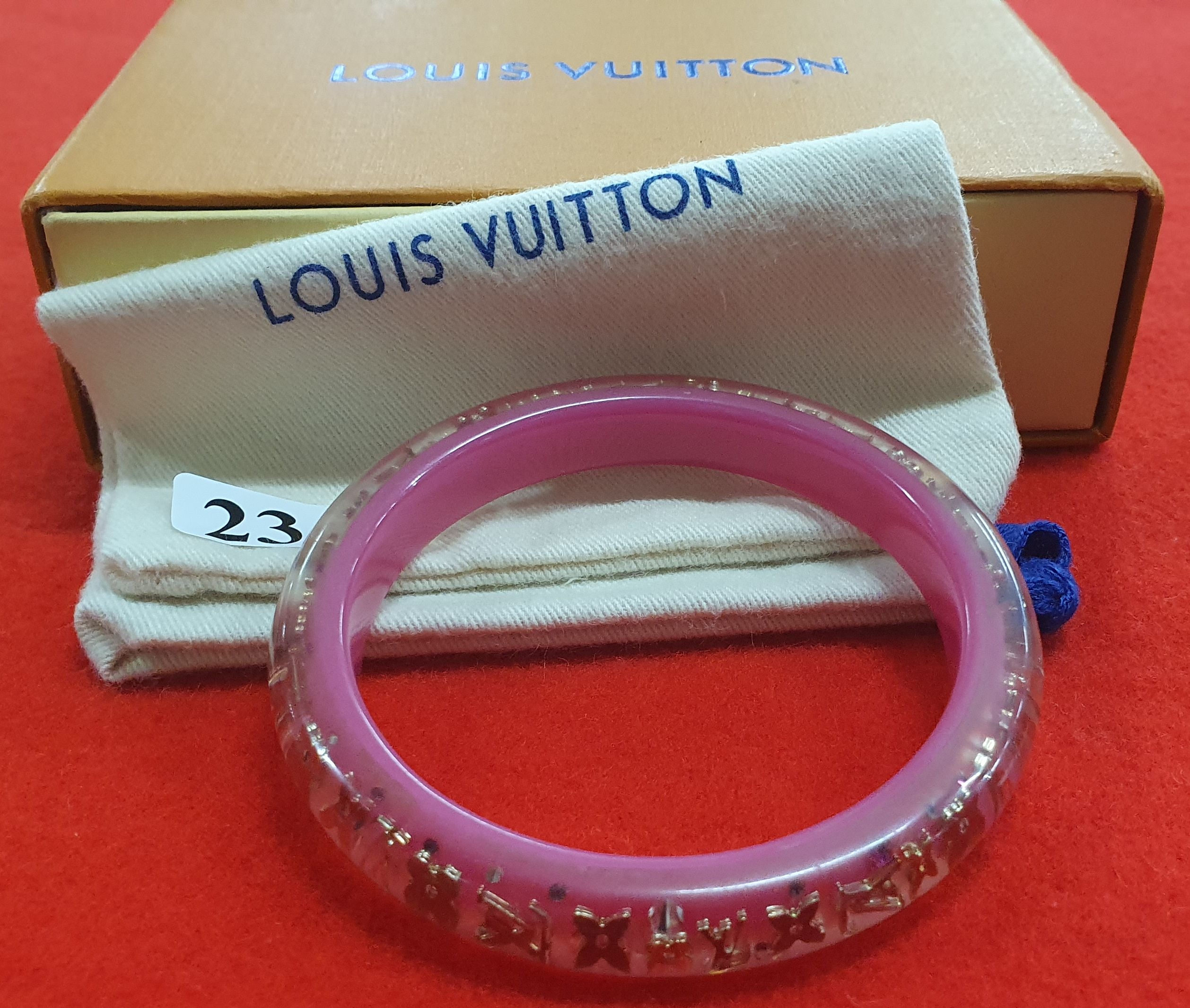 Louis Vuitton | A LOUIS VUITTON PINK INCLUSION BANGLE | MutualArt