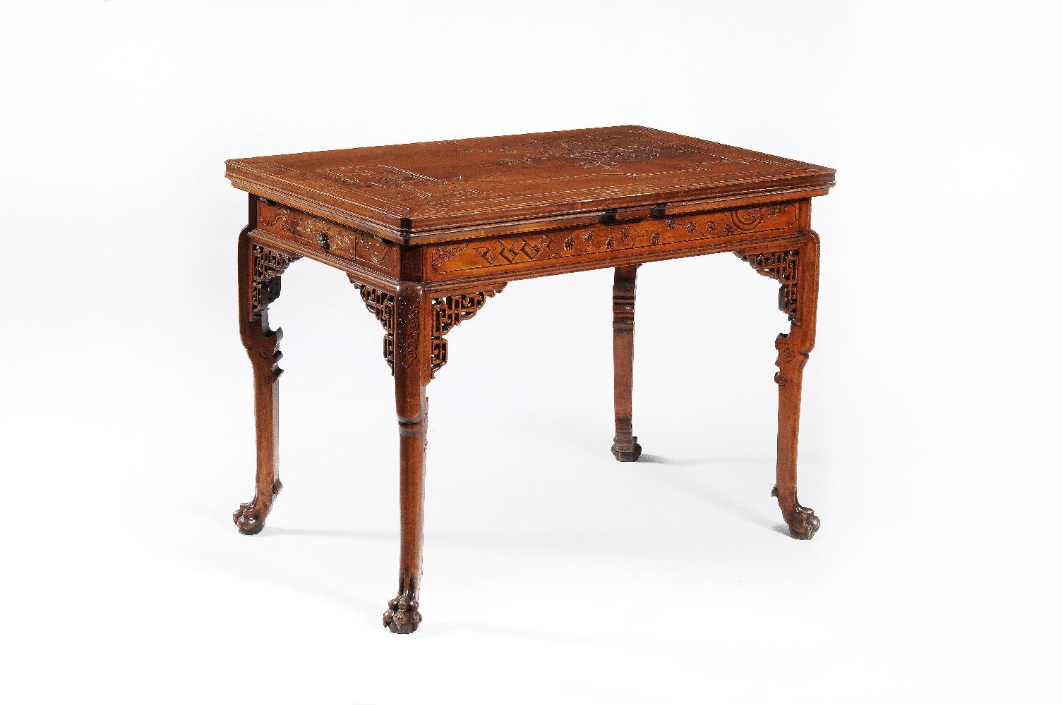Gabriel Viardot | ‡A French ‘Japonisme’ carved beechwood draw leaf ...