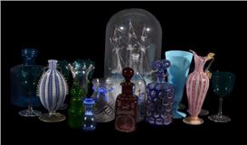 Fuller Leonard | A glass frigger model of a ship beneath a glass dome ...