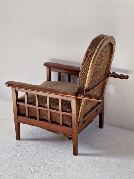 Théodore Lambert | Fauteuil à crémaillère en acajou | MutualArt