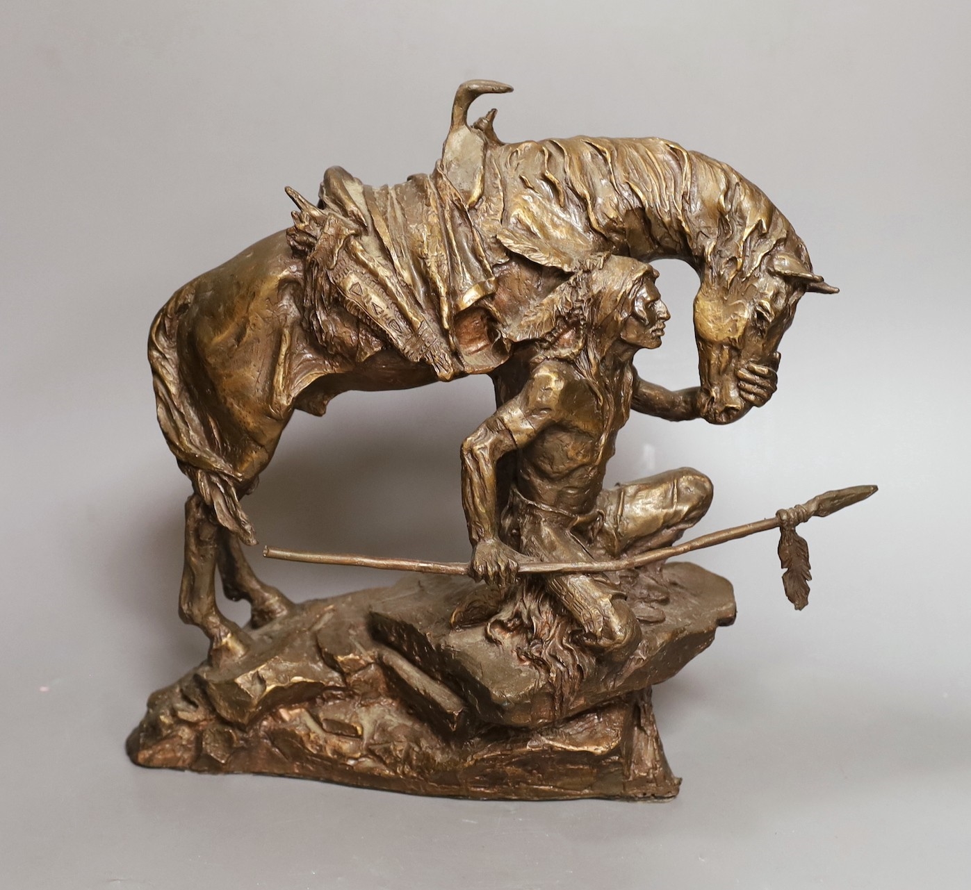 Buck McCain | A bronze figure group of a Native American kneeling next ...
