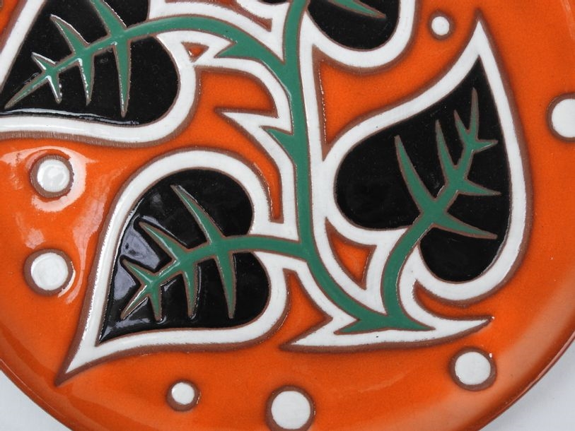 Jean Picart le Doux | Ceramic plate decorated with four leaves on an ...