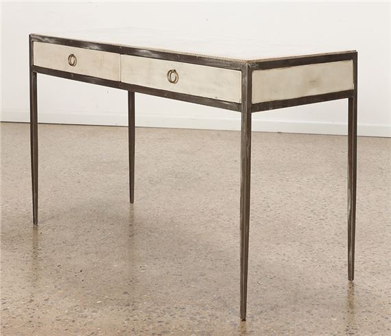 Jean-Michel Frank | A polished iron and leather writing desk in the ...