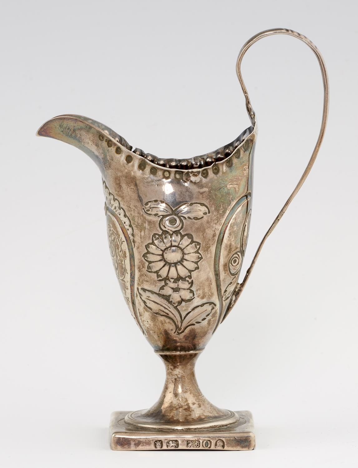 Hester Bateman | A GEORGE III HELMET SHAPED SILVER CREAM JUG chased ...