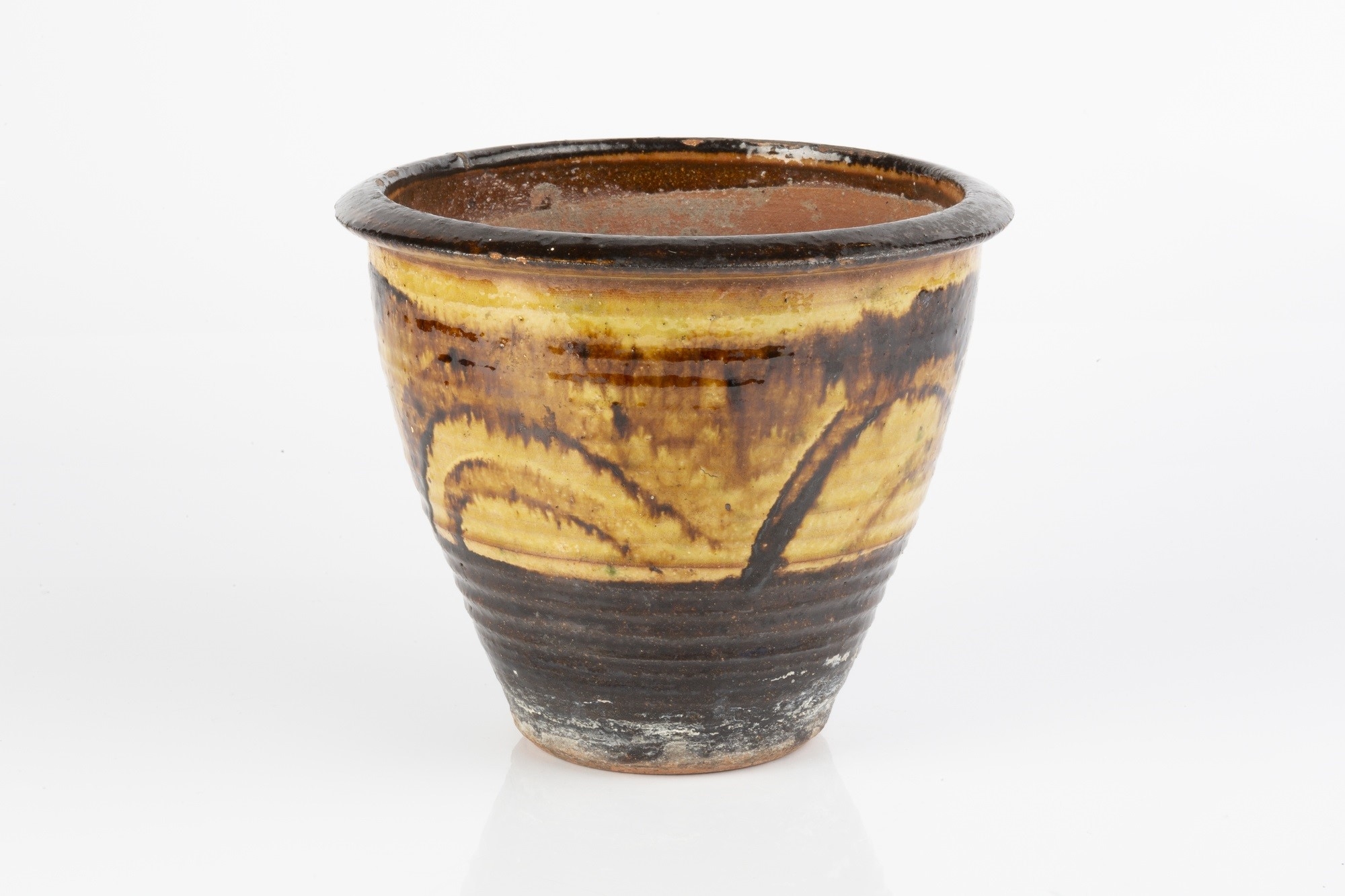 Ray Finch | An early pot slipware with yellow and dark glaze | MutualArt