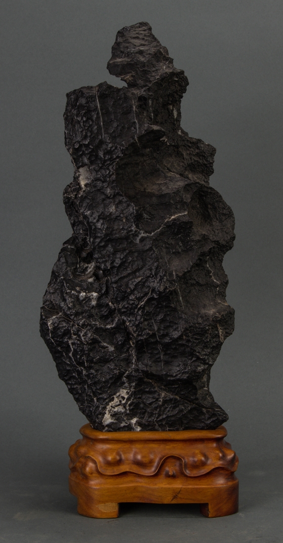 Chinese School | Scholar's rock, of homogeneous grey color and having a ...