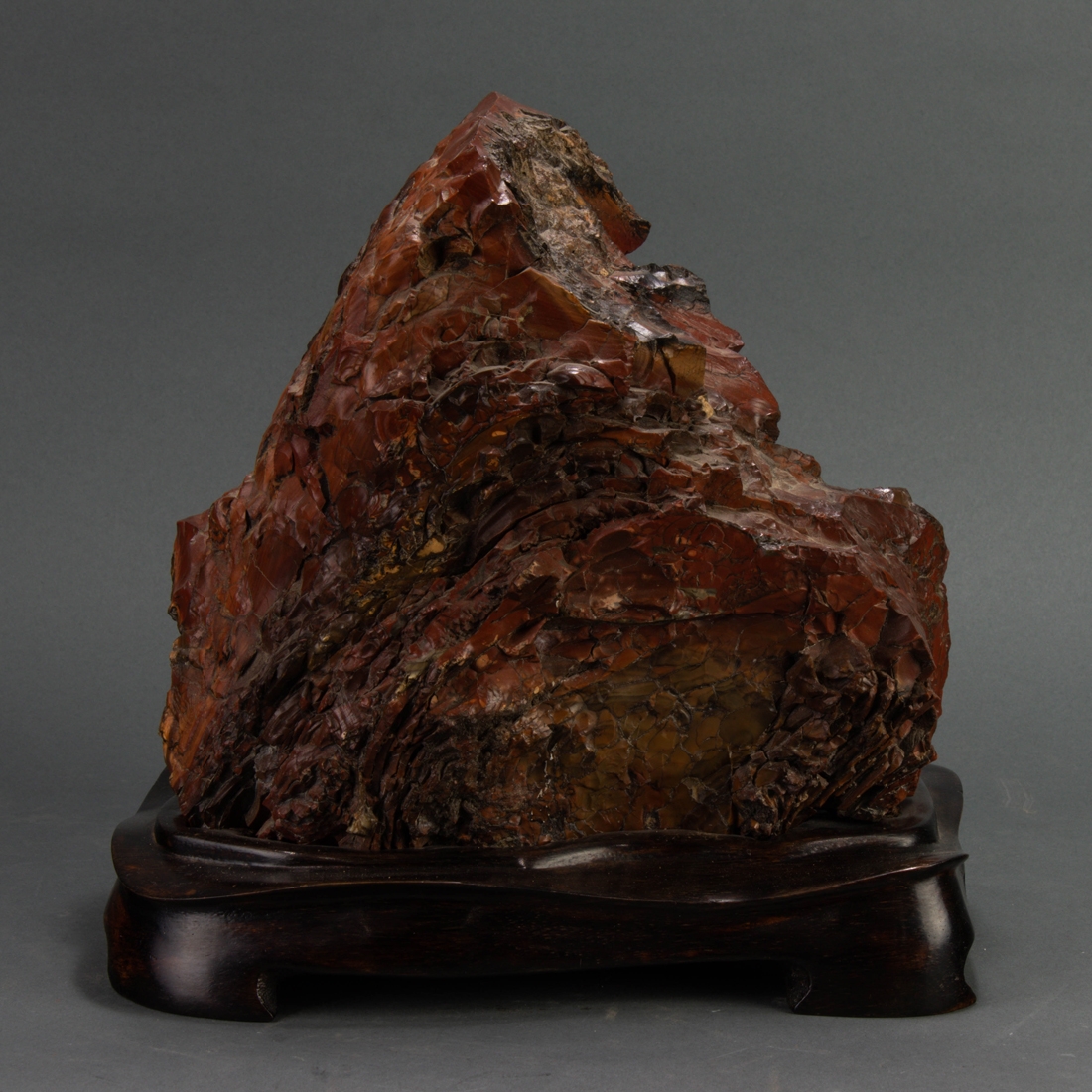 Chinese School | Scholar's rock, of triangular form displaying ...