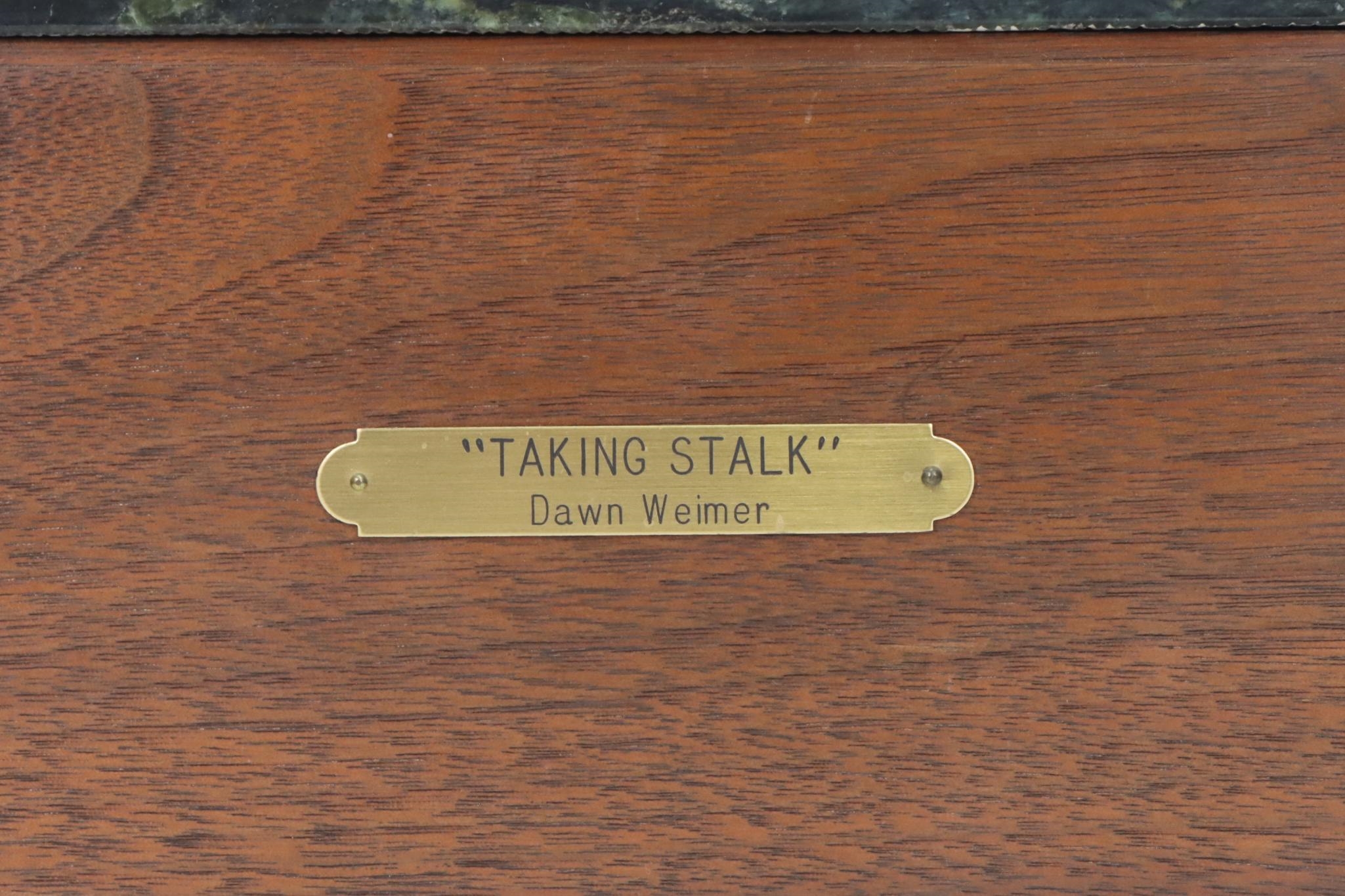 Dawn Weimer | depicting a mountain lion mounted to a marble slab on a ...