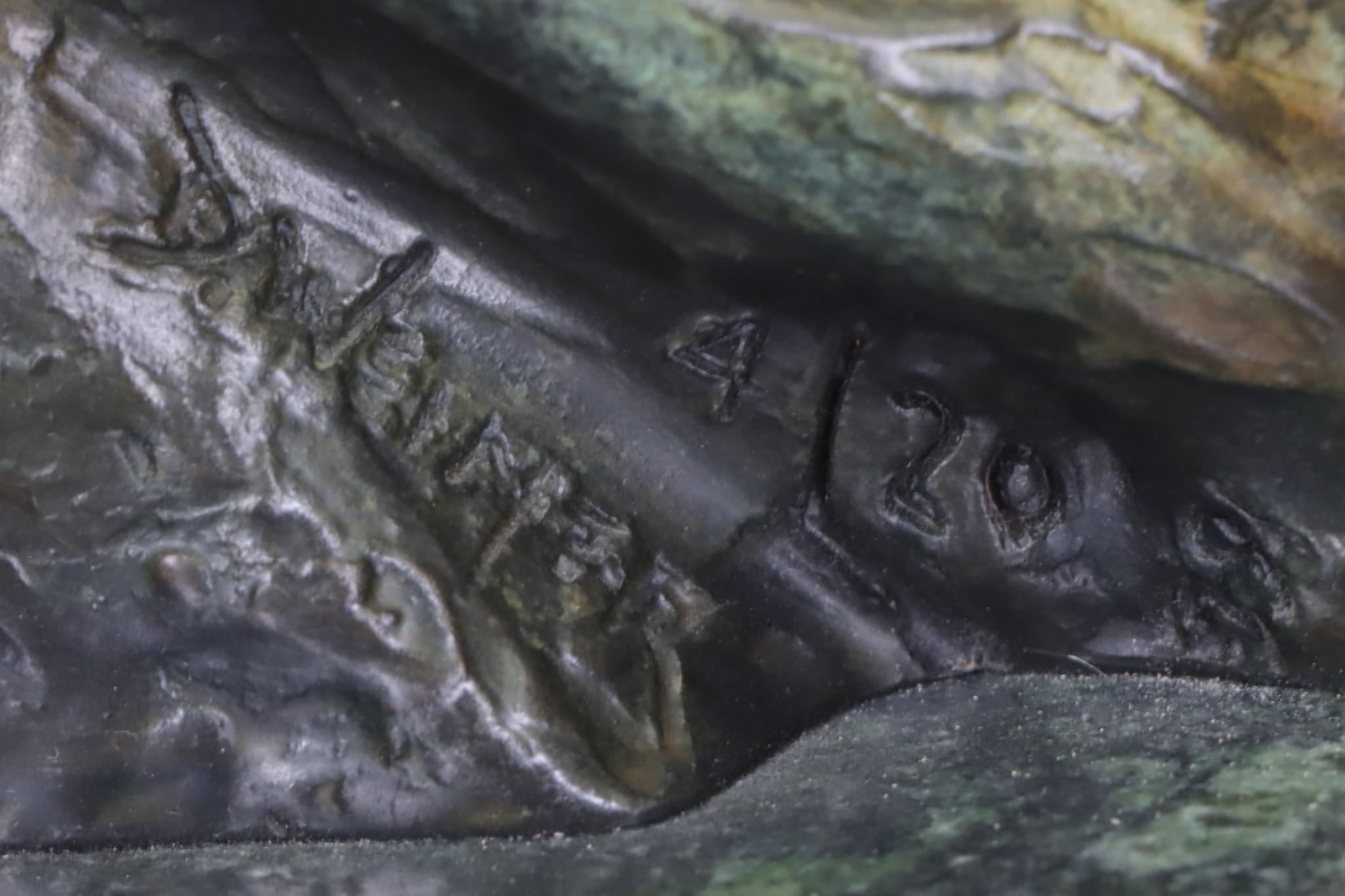 Dawn Weimer | depicting a mountain lion mounted to a marble slab on a ...