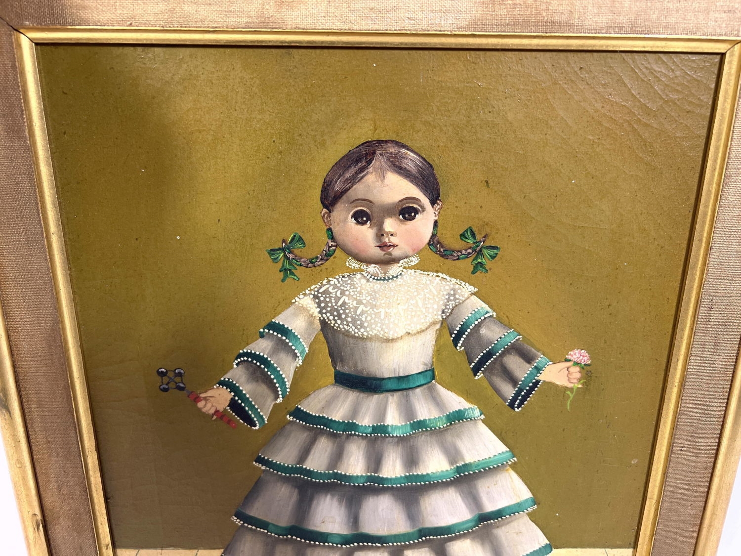 Agapito Labios | Young child girl with ponytail holding toy and flower ...