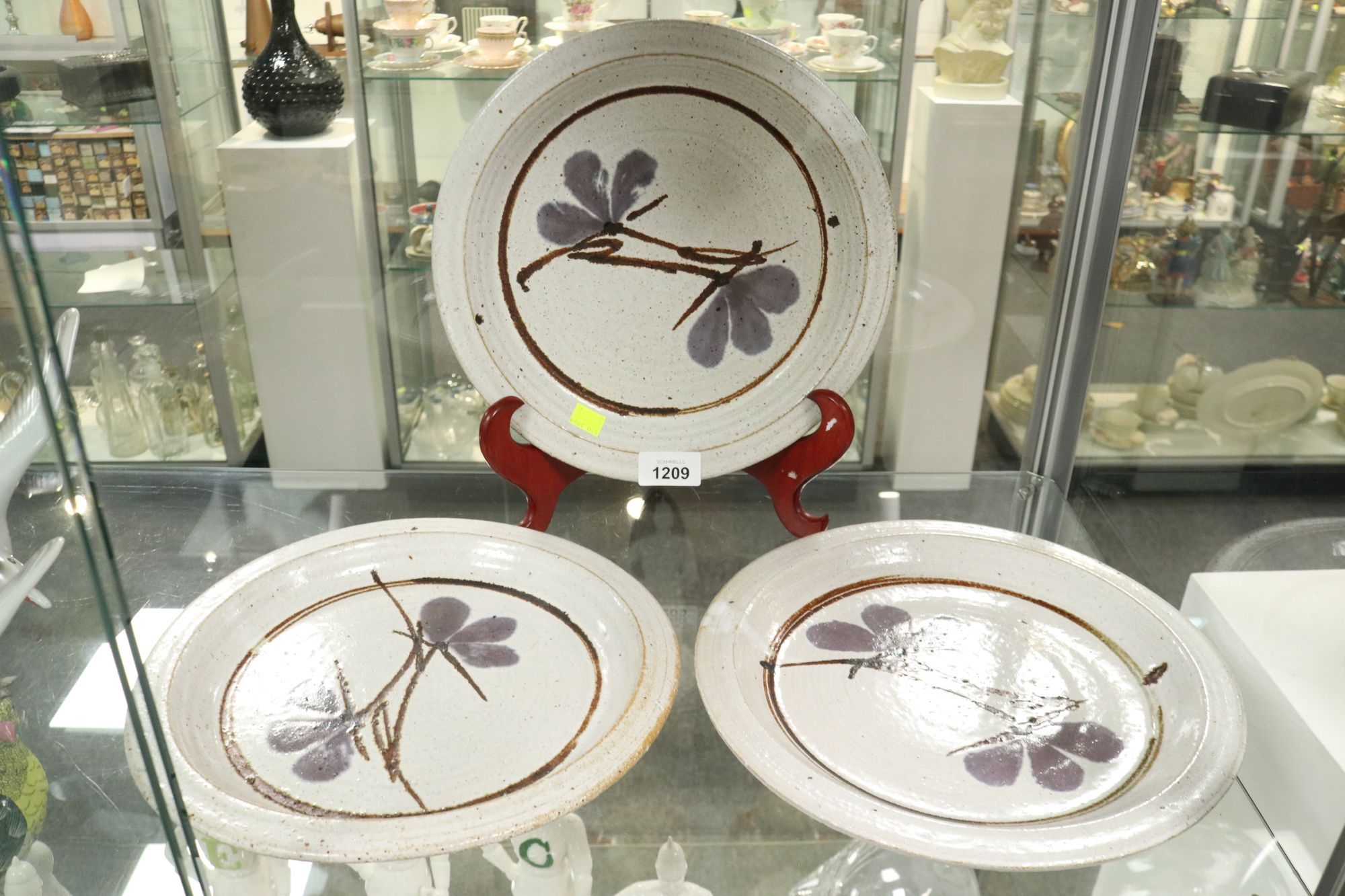Milton Moon | Three Pottery Plates with Floral Design | MutualArt