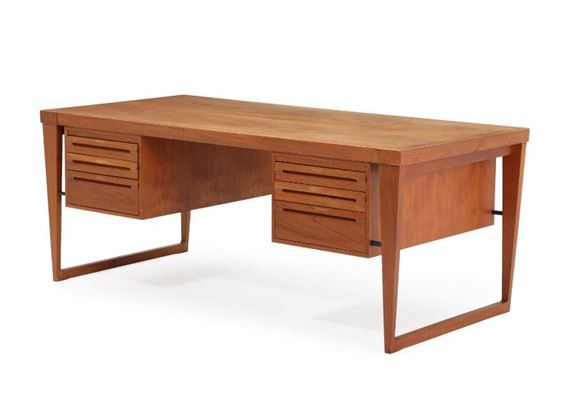 Kai Kristiansen | A free-standing teak desk on runner legs with 12 ...