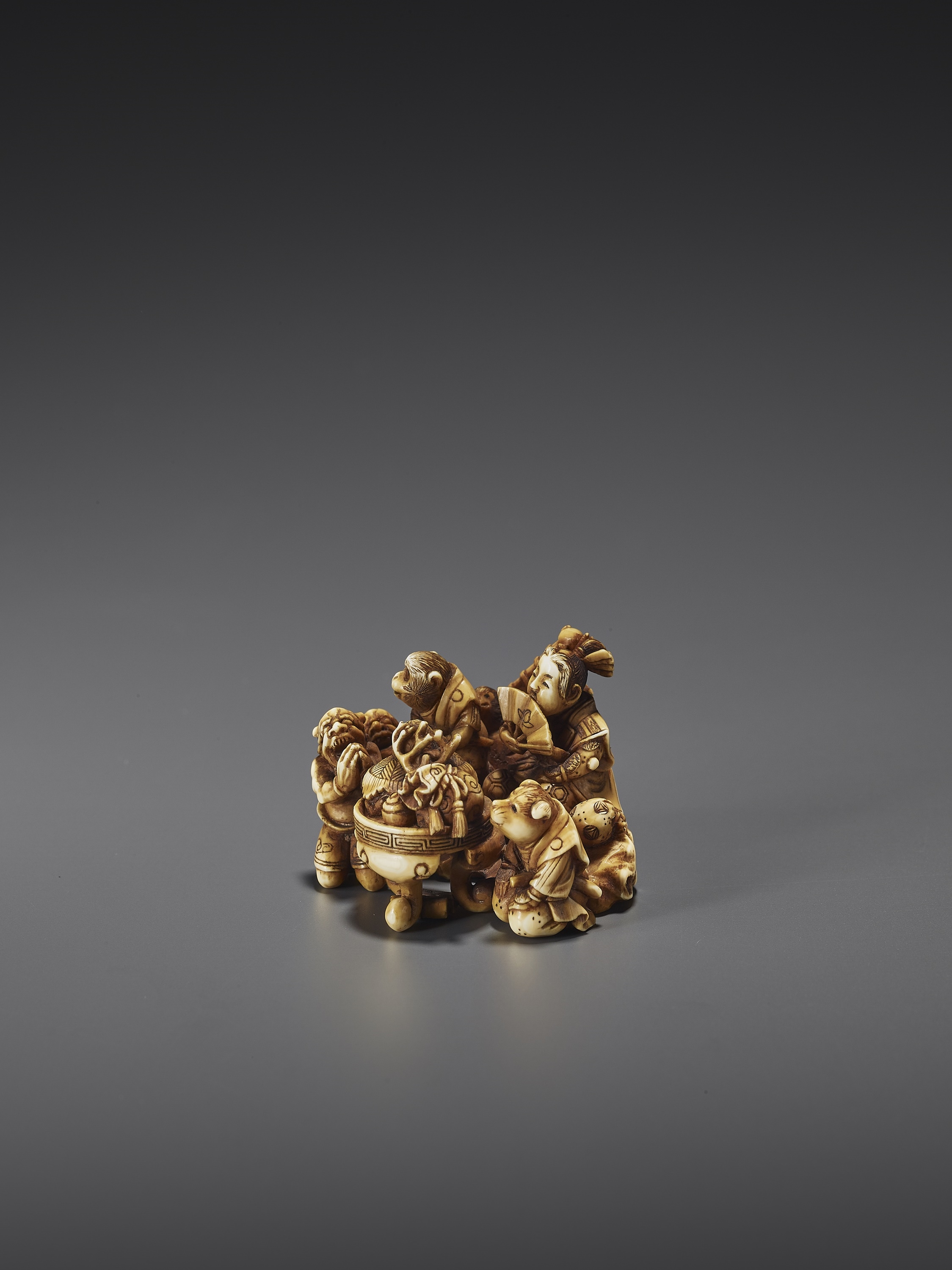 Momotaro | AN IVORY NETSUKE OF THE LEGEND OF MOMOTARO BY MITSUO | MutualArt