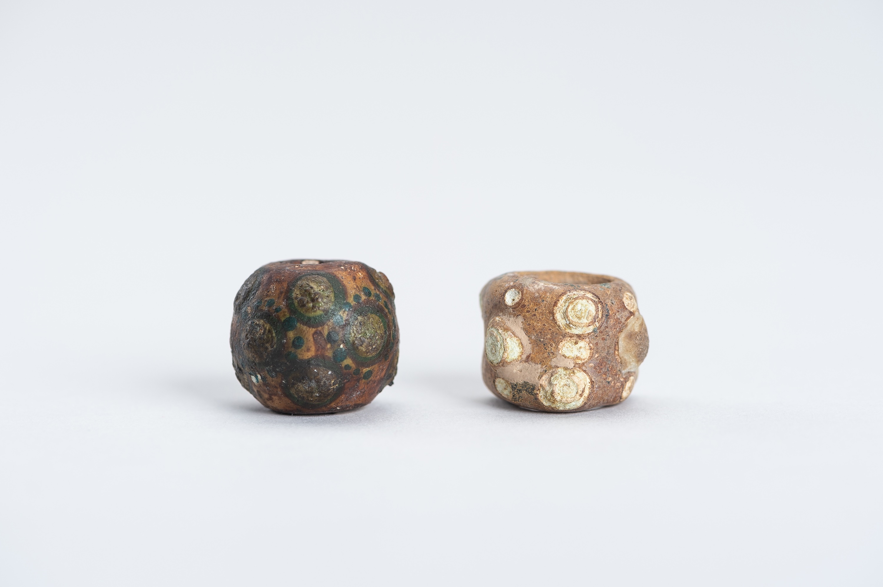 Han Dynasty | TWO GLASS BEADS, HAN DYNASTY | MutualArt