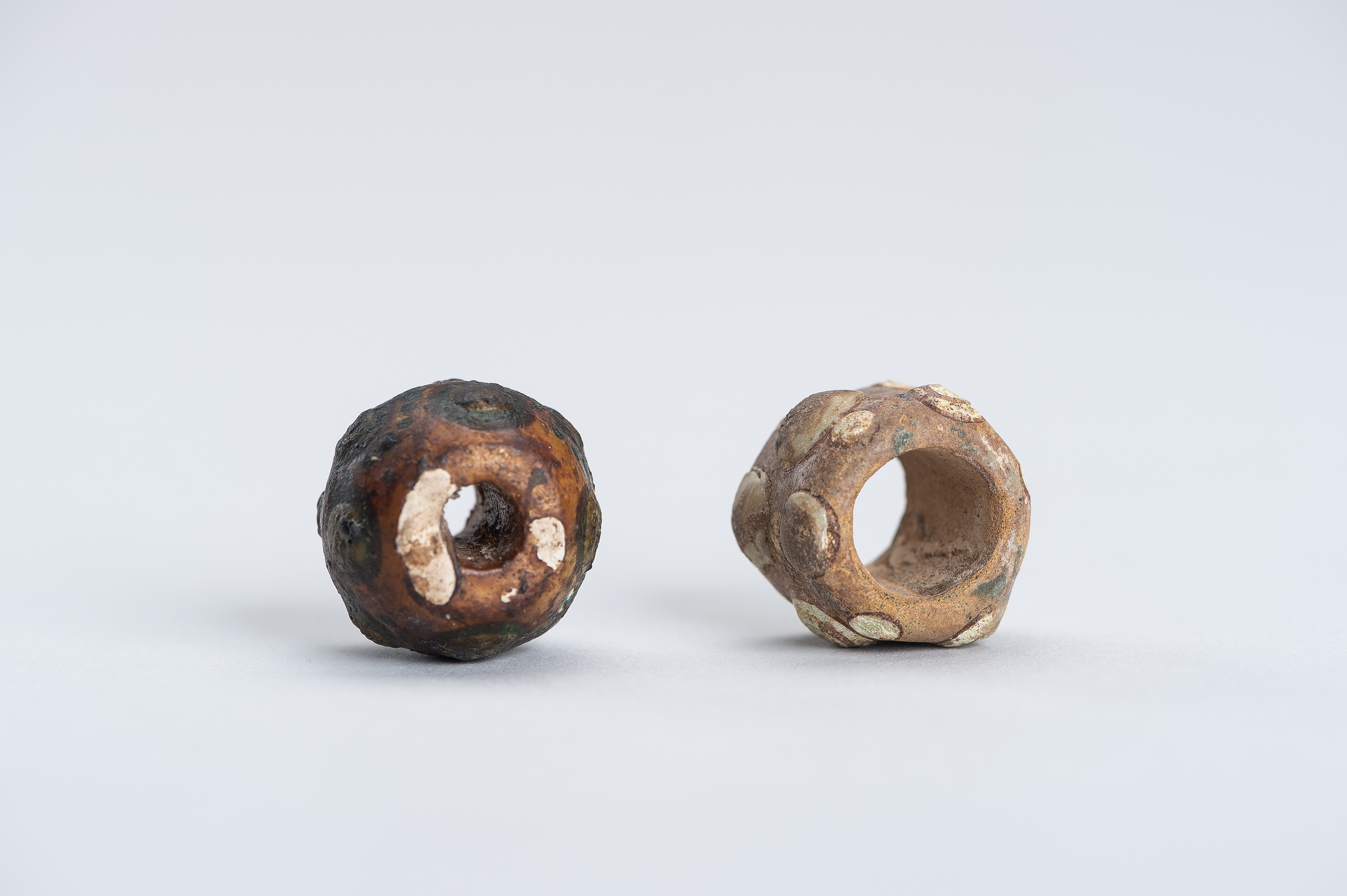 Han Dynasty | TWO GLASS BEADS, HAN DYNASTY | MutualArt