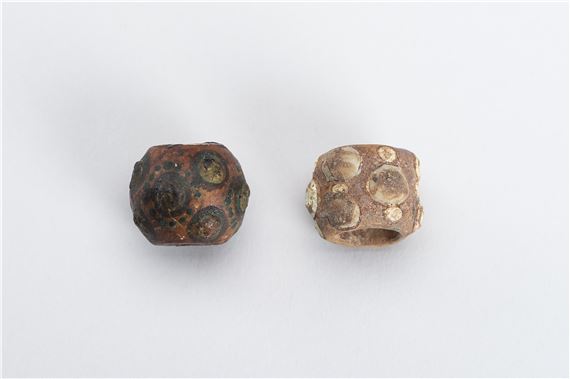 Han Dynasty | TWO GLASS BEADS, HAN DYNASTY | MutualArt
