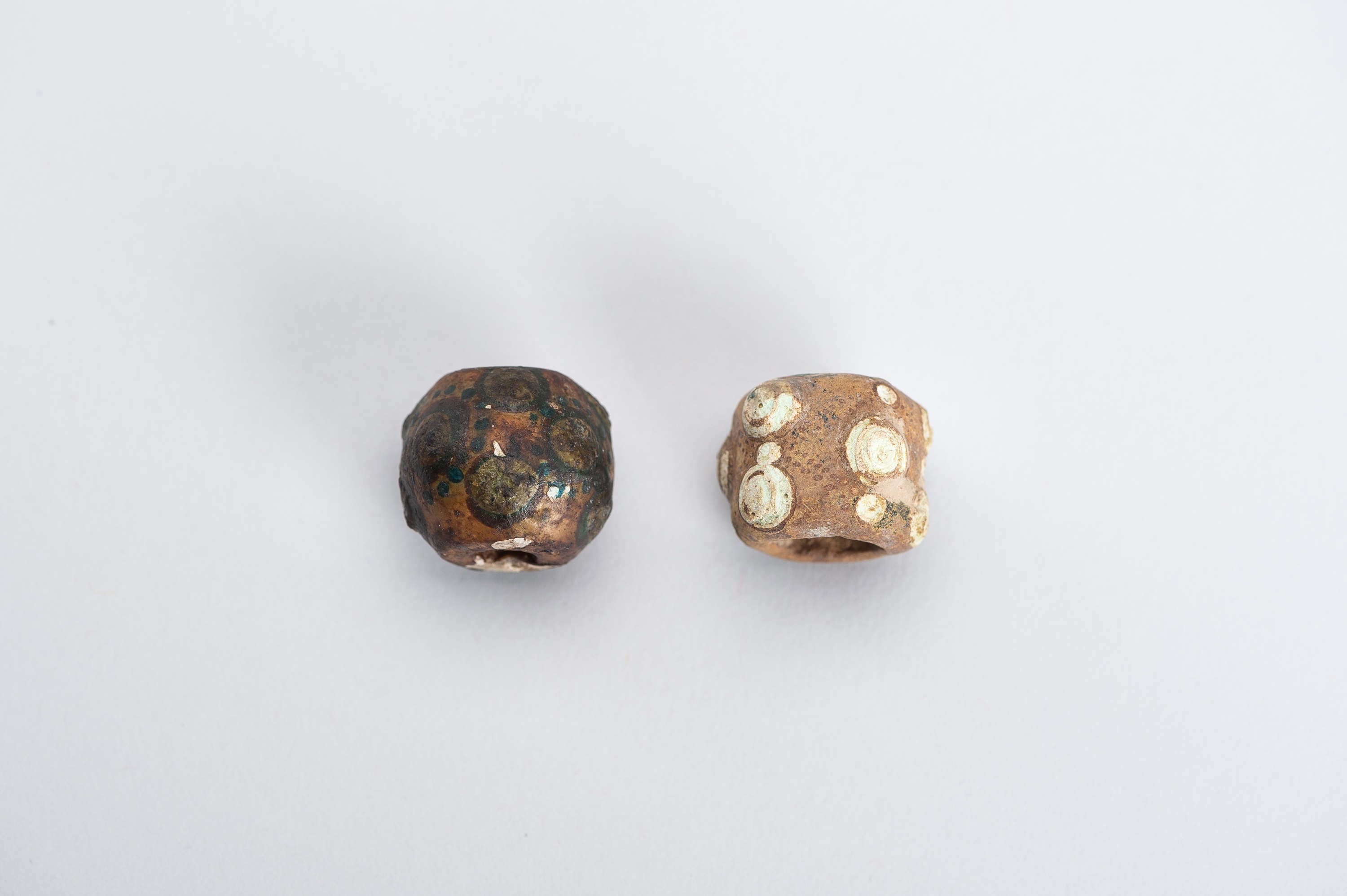 Han Dynasty | TWO GLASS BEADS, HAN DYNASTY | MutualArt