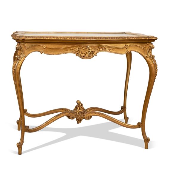 Louis XV | ROCOCO STYLE GILTWOOD TABLE WITH INSET GLASS PANEL | MutualArt