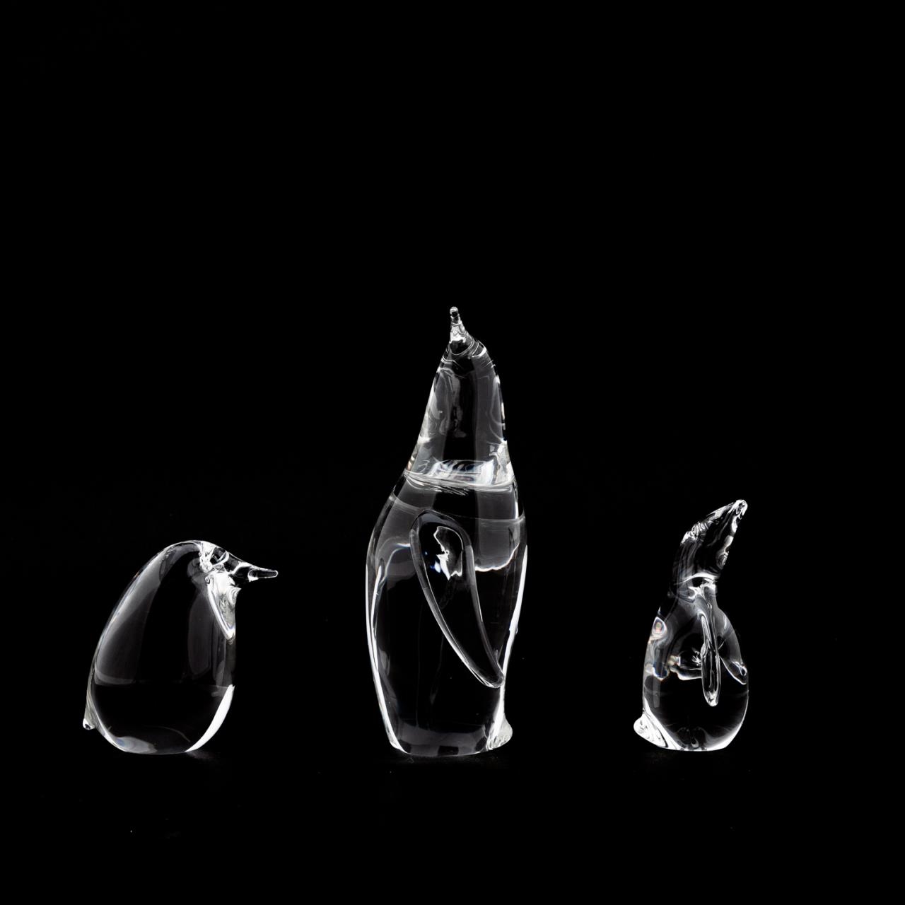 Steuben Glass | THREE STEUBEN CRYSTAL PENGUIN FIGURINES (1973) | MutualArt