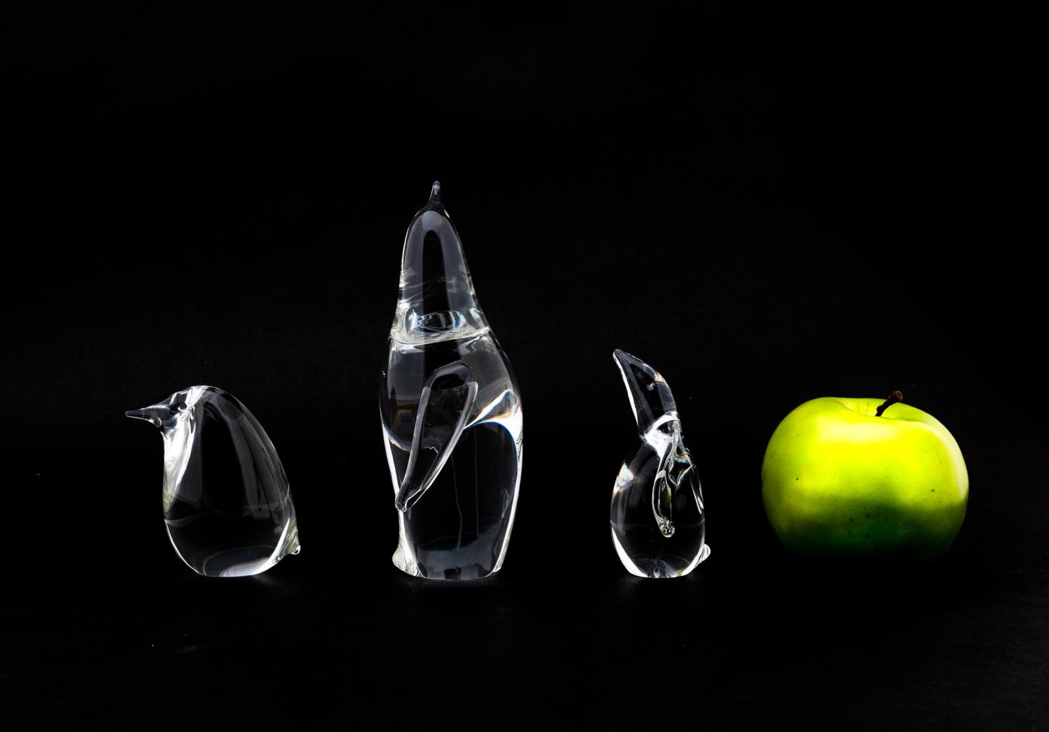 Steuben Glass | THREE STEUBEN CRYSTAL PENGUIN FIGURINES (1973) | MutualArt
