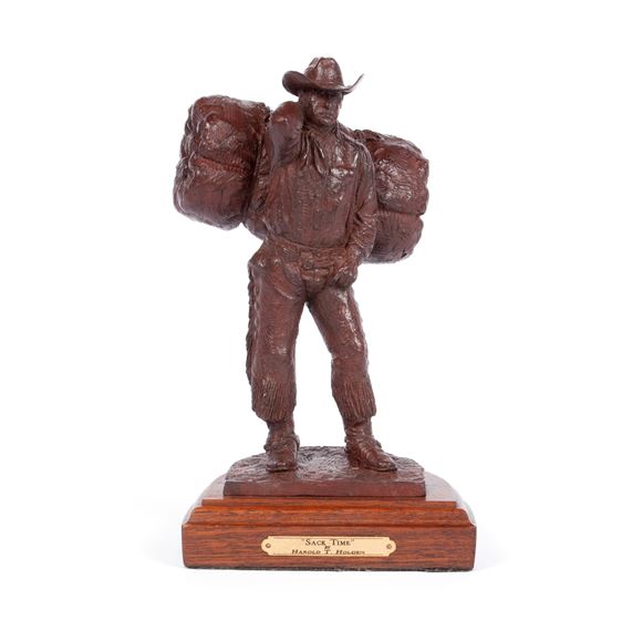 Harold Holden | Desktop bronze of a cowboy with sack roll over one ...