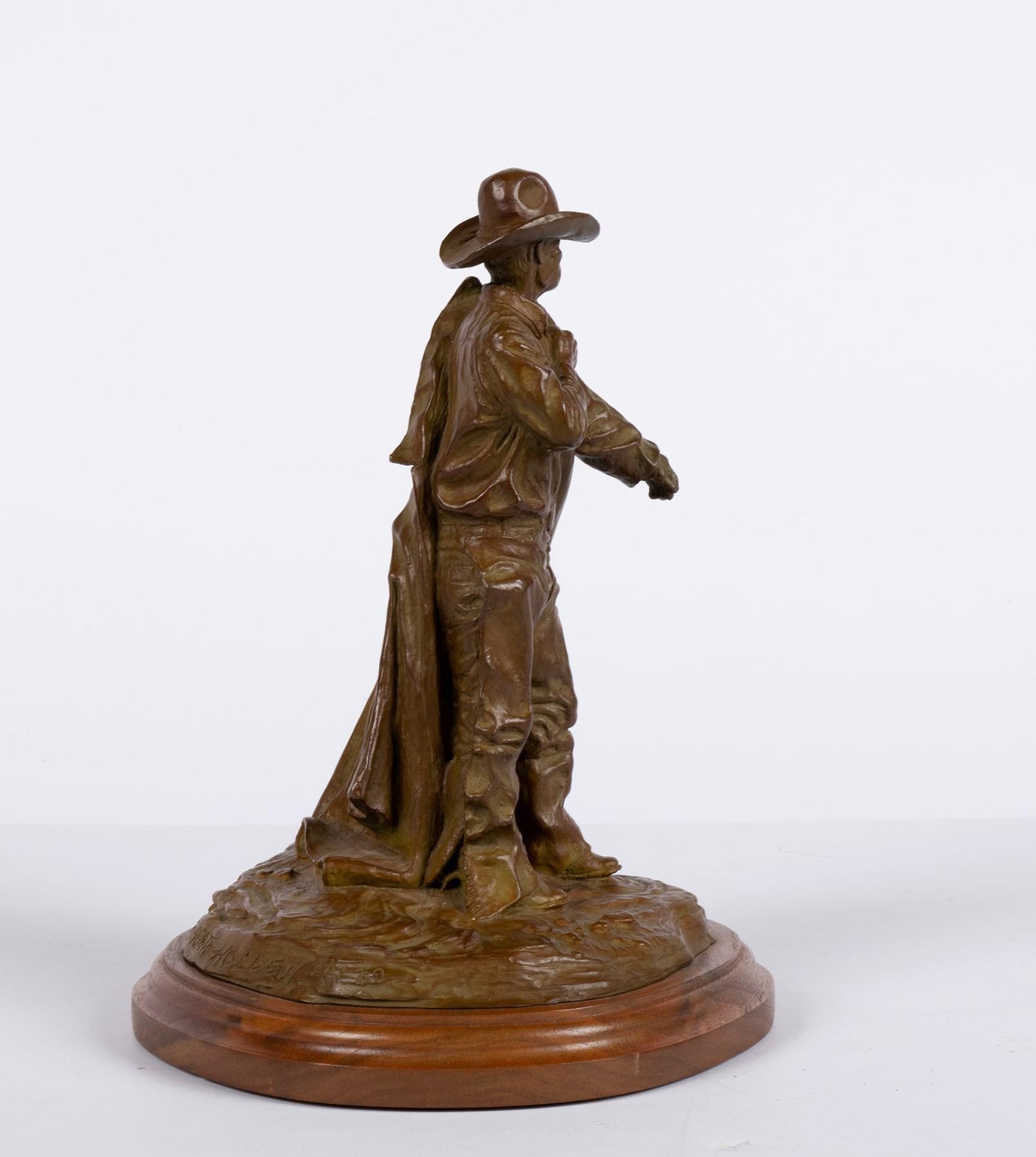 Harold Holden | Small bronze of cowboy putting on his duster (1940 ...