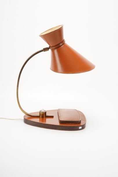 Jacques Adnet | The free-form base opens with a flap onto a storage ...