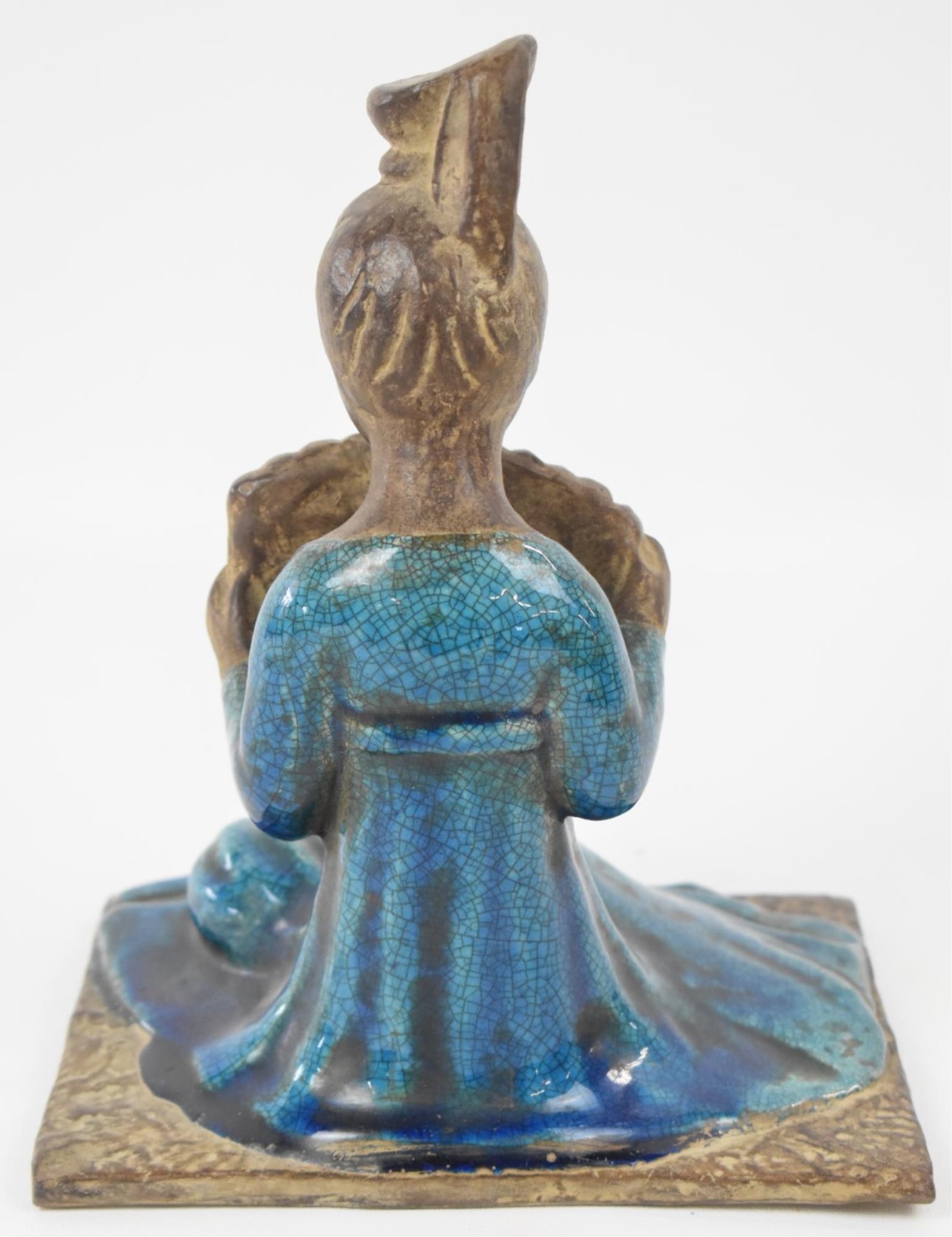 Ugo Zaccagnini | signed on base. Features geisha figure playing pan ...