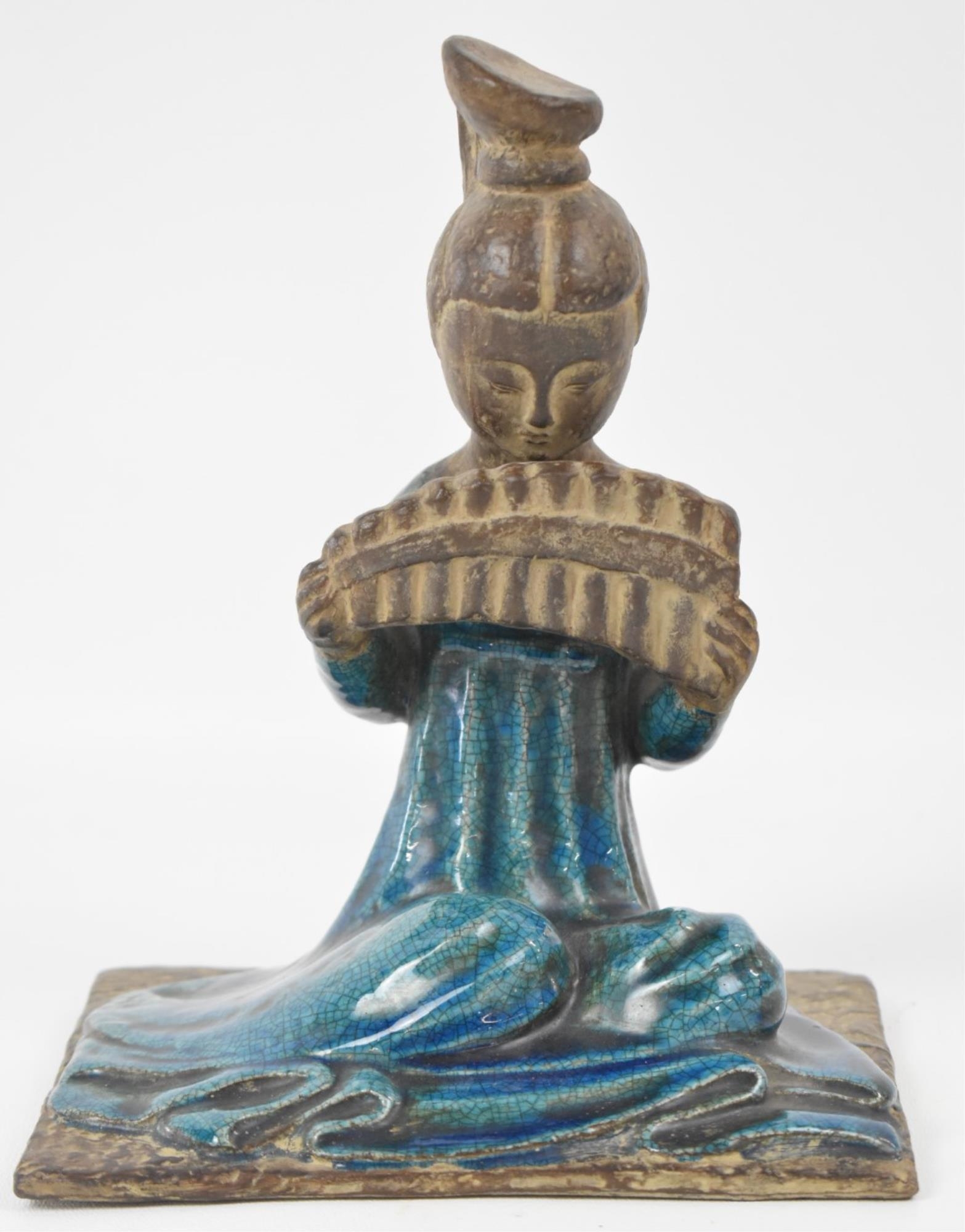 Ugo Zaccagnini | signed on base. Features geisha figure playing pan ...