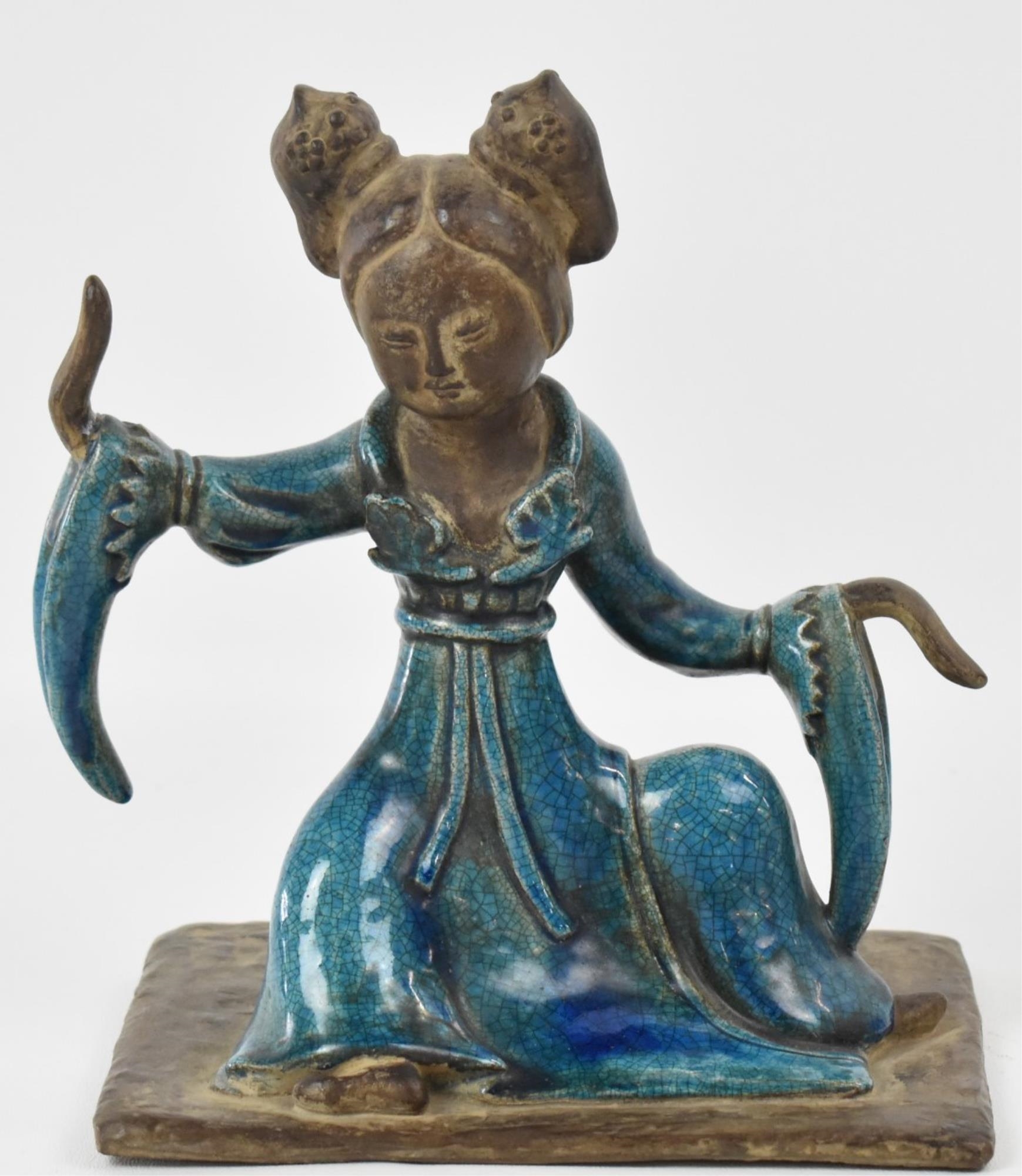 Ugo Zaccagnini | signed on base. Features geisha figure playing zither ...