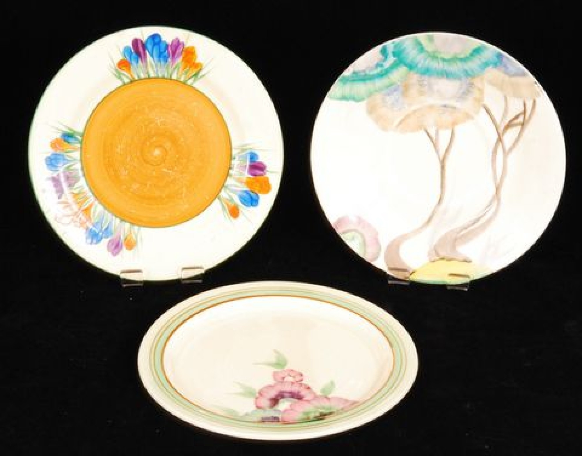 Clarice Cliff | Three Clarice Cliff side plates comprising one 'Crocus ...
