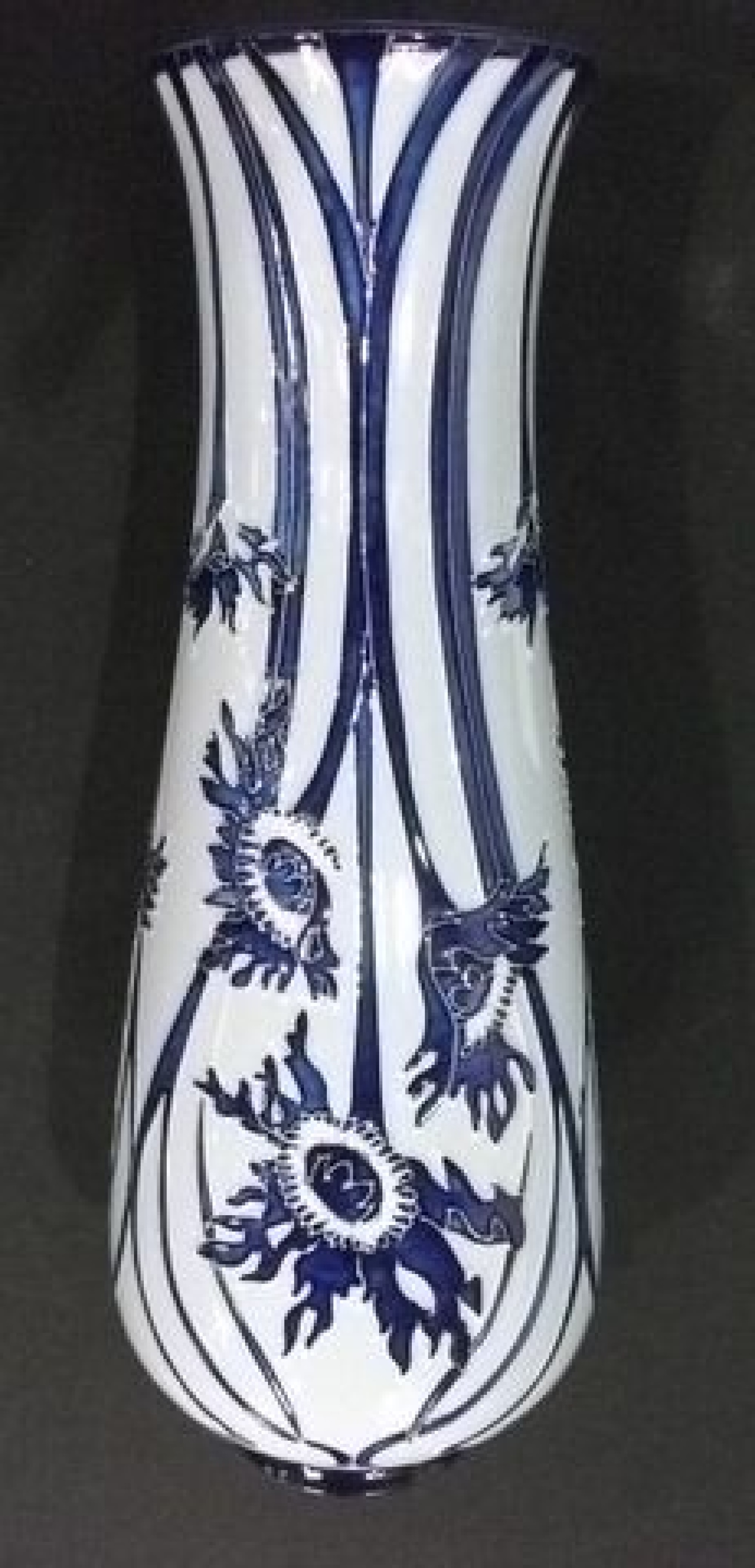 William Moorcroft | A large Moorcroft Pottery vase of slender ...