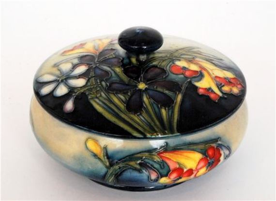 William Moorcroft | A Moorcroft pottery powder bowl decorated in the ...