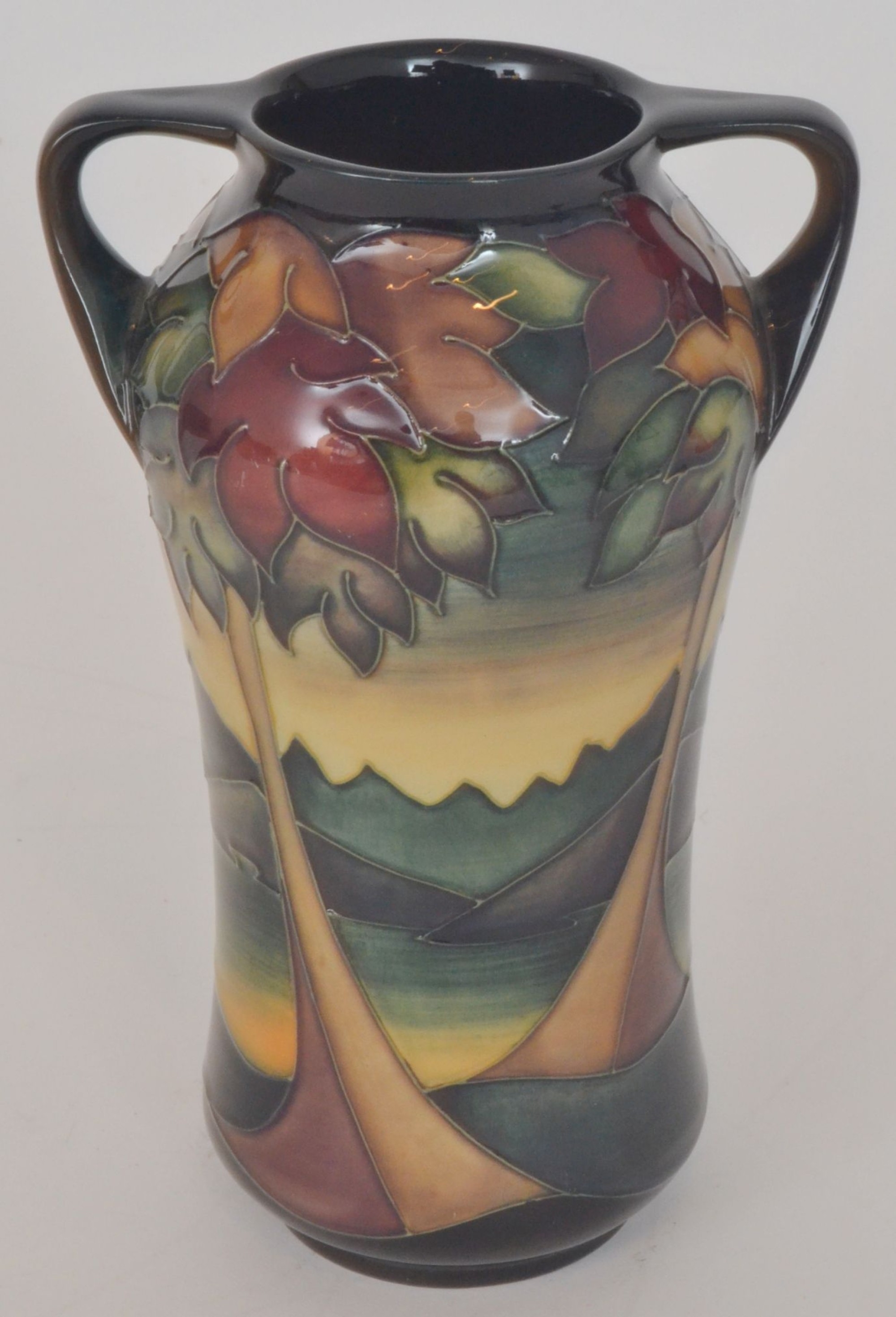 William Moorcroft | A Moorcroft Pottery vase tubelined with a landscape ...