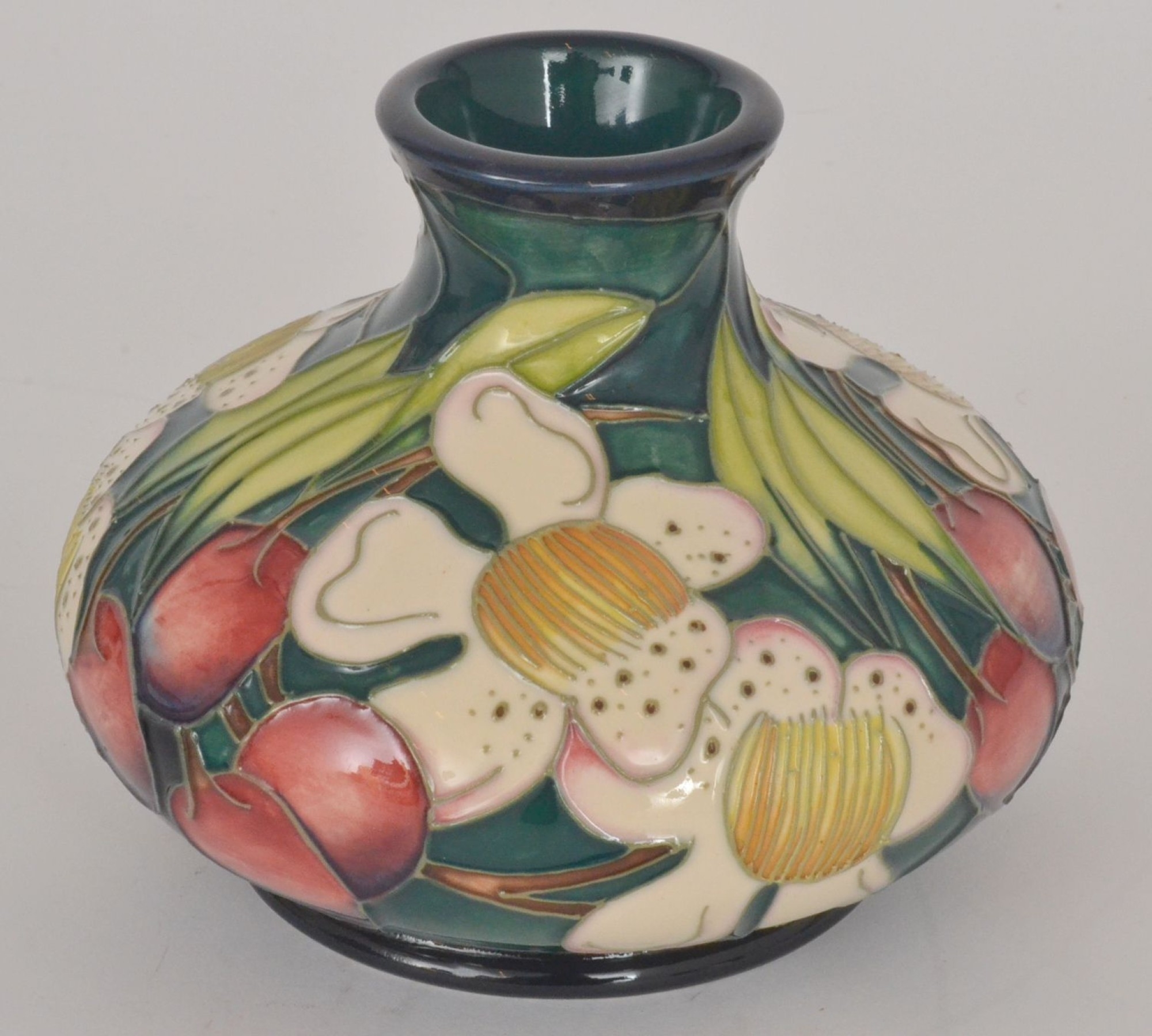 William Moorcroft | A Moorcroft Pottery floral pattern vase designed by ...