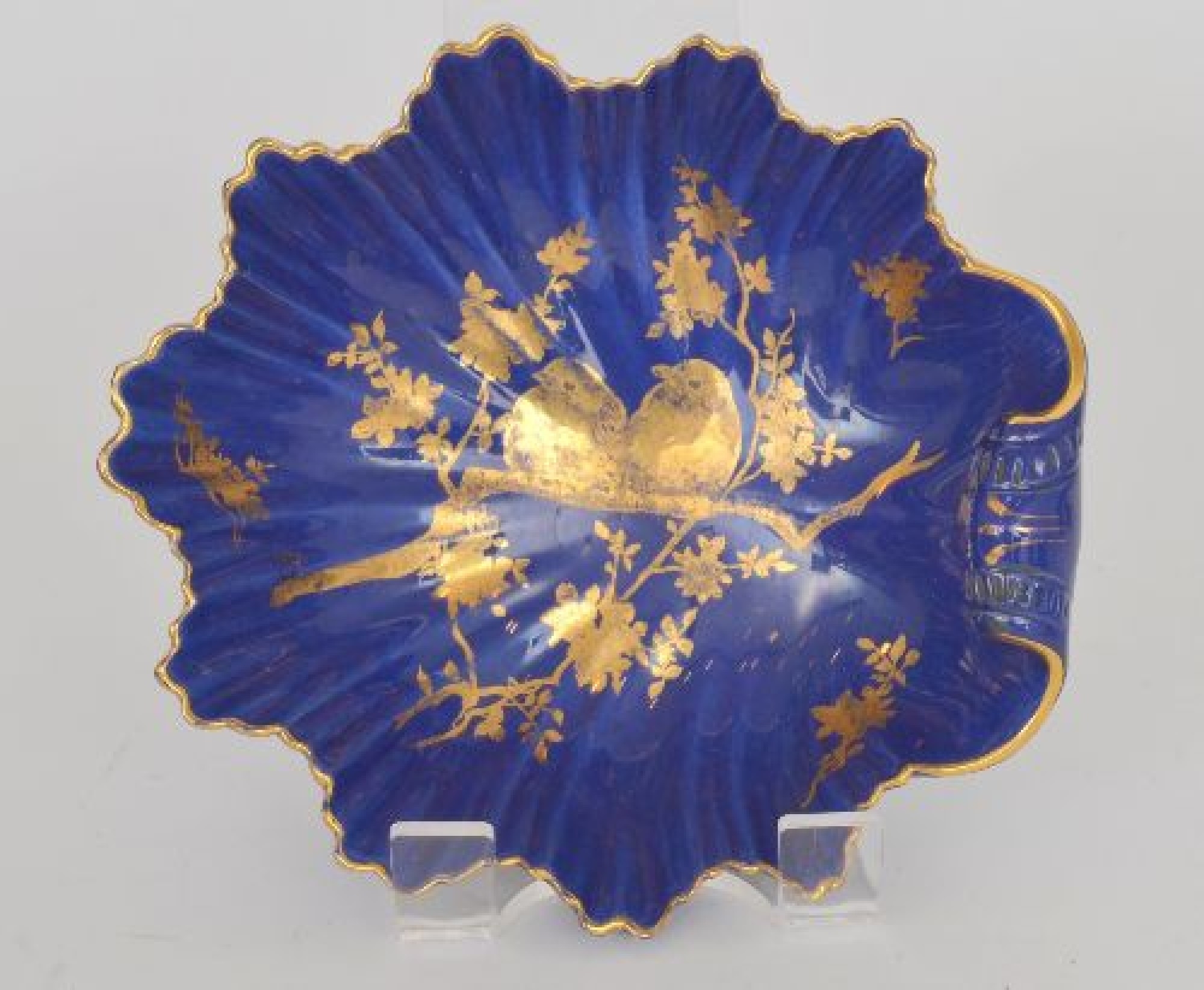 Robinson | A Wiltshaw and Robinson Carlton Ware dish of shell form with ...