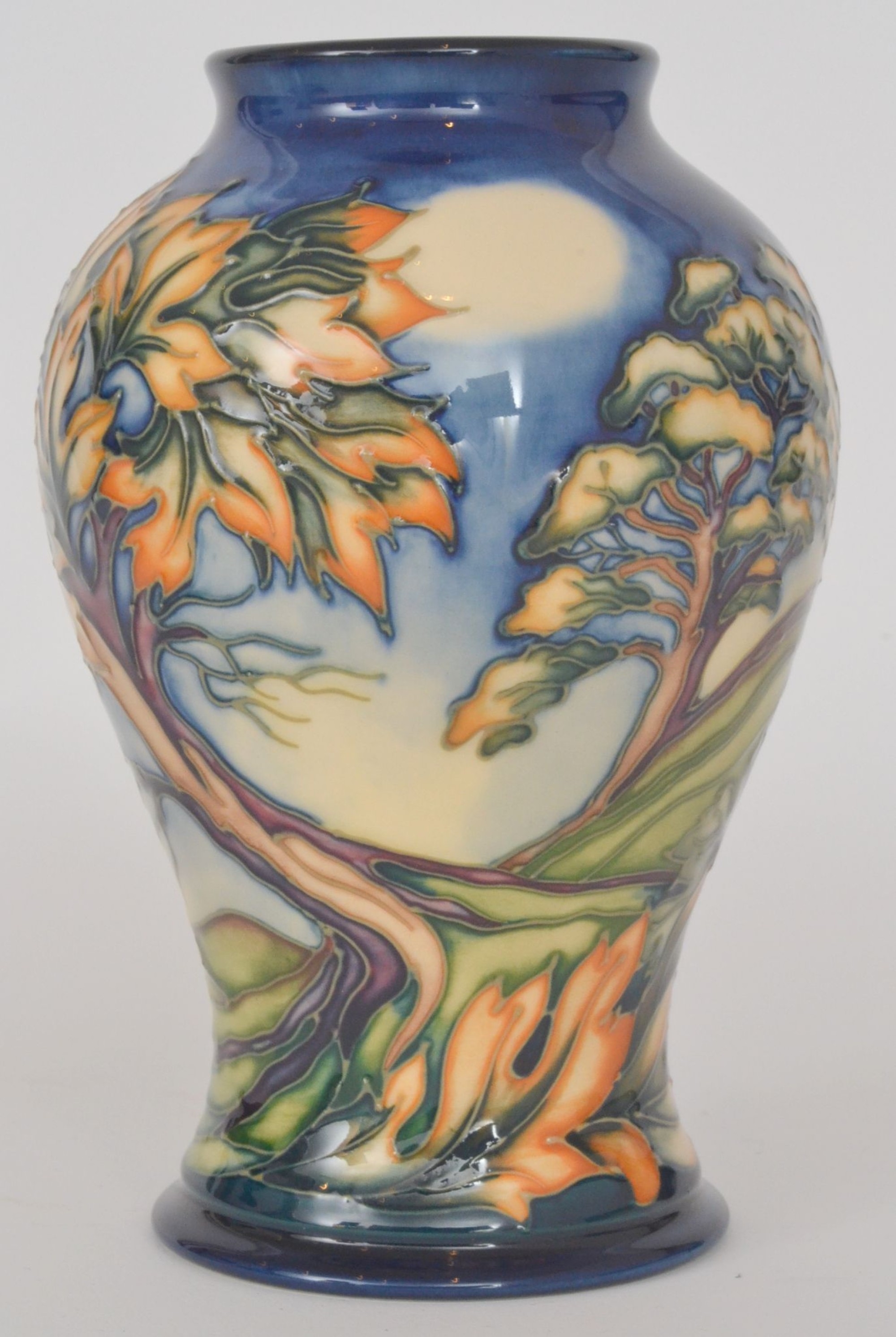 William Moorcroft | A Moorcroft Pottery baluster vase decorated in the ...