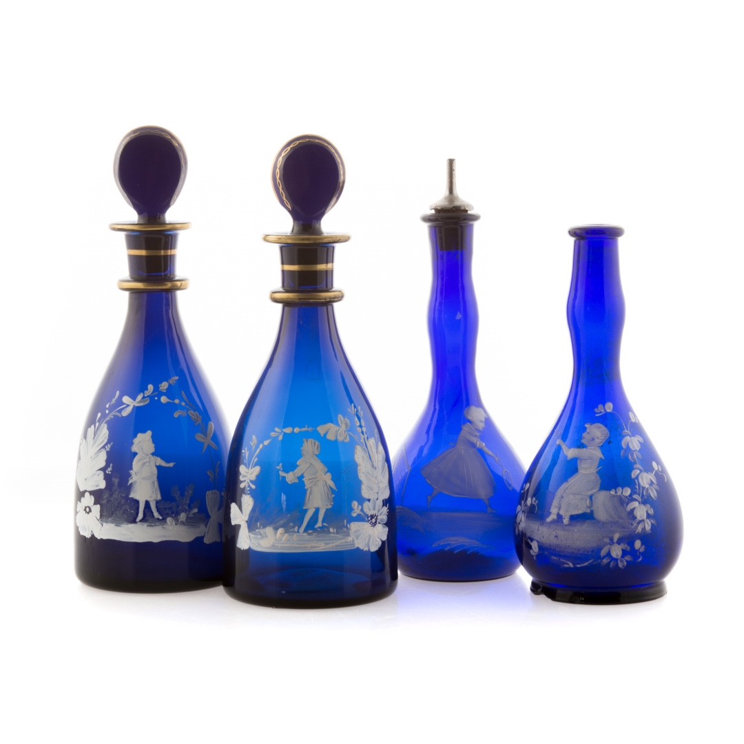 Mary Gregory | Four Mary Gregory cobalt glass articles | MutualArt