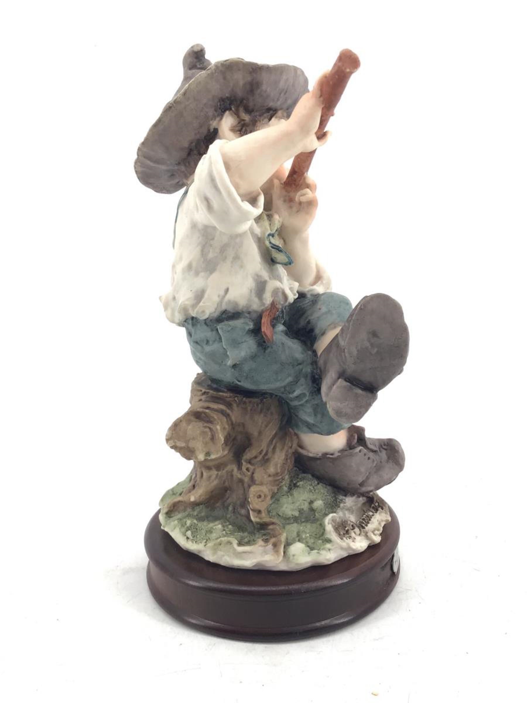 Giuseppe Armani | It features a little boy playing the flute, andis ...