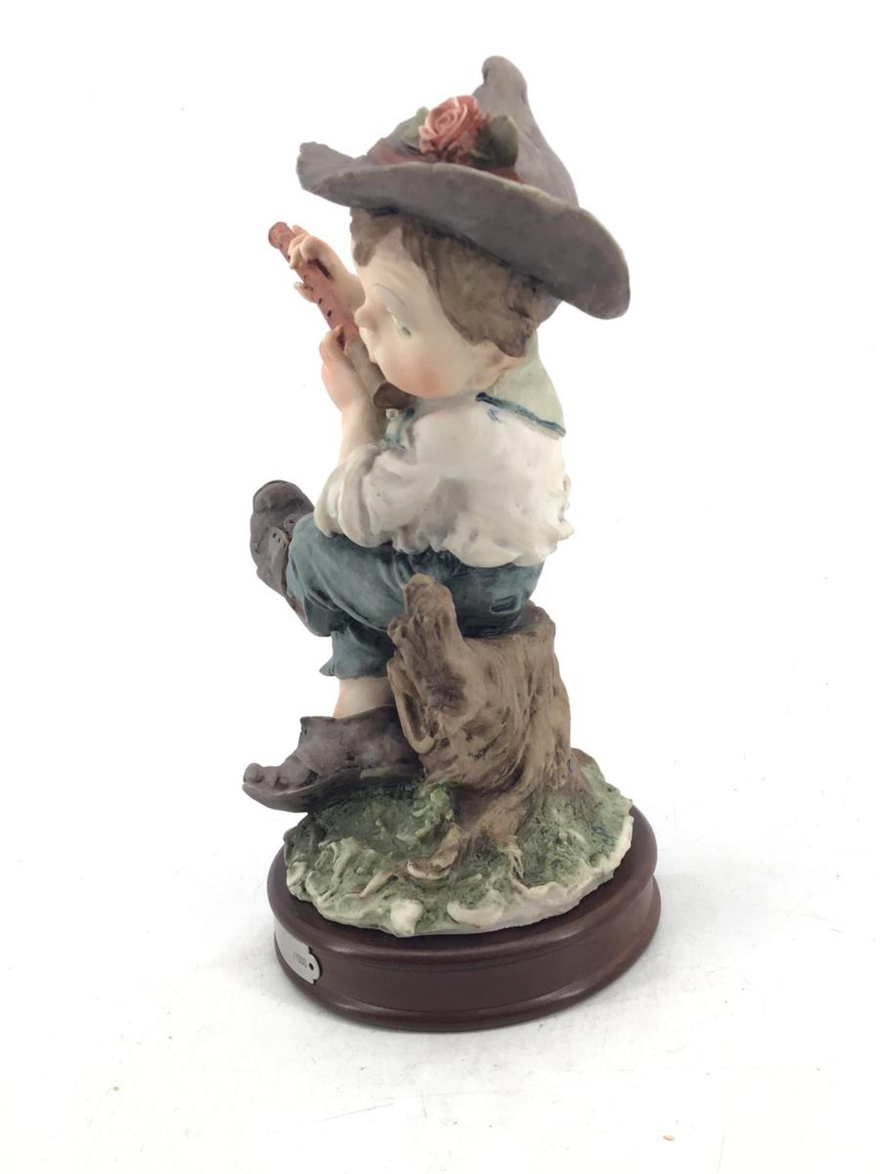 Giuseppe Armani | It features a little boy playing the flute, andis ...