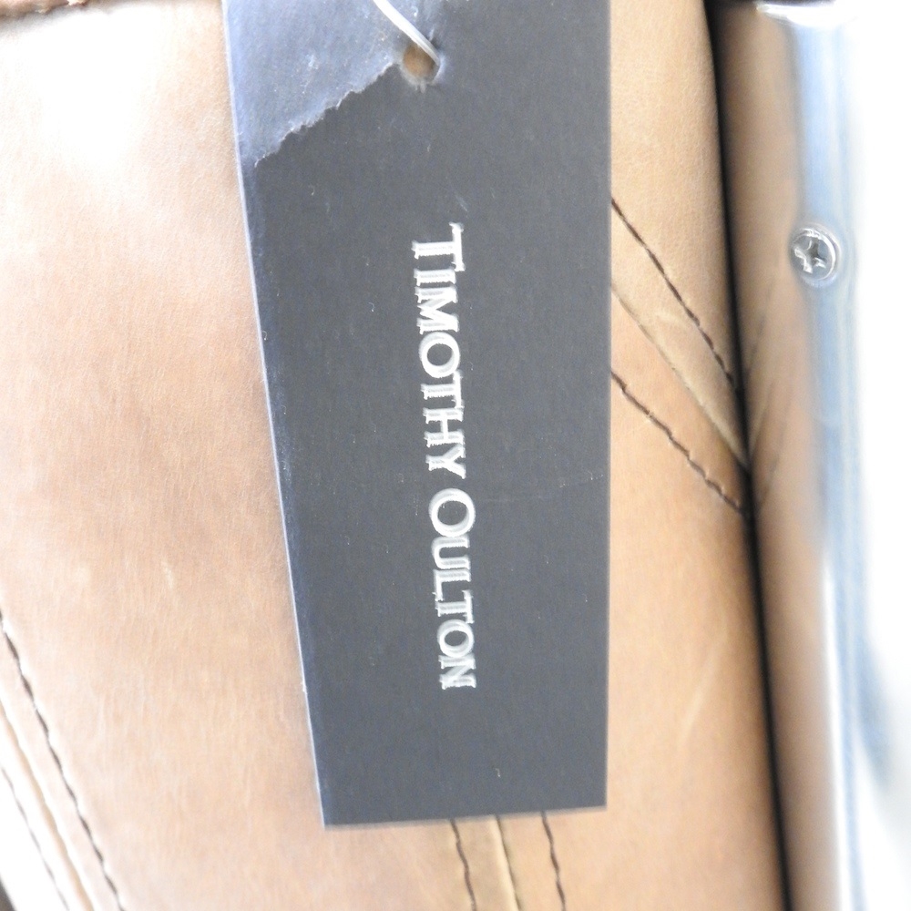 Timothy Oulton | A Timothy Oulton Aviator Tomcat designer chair | MutualArt